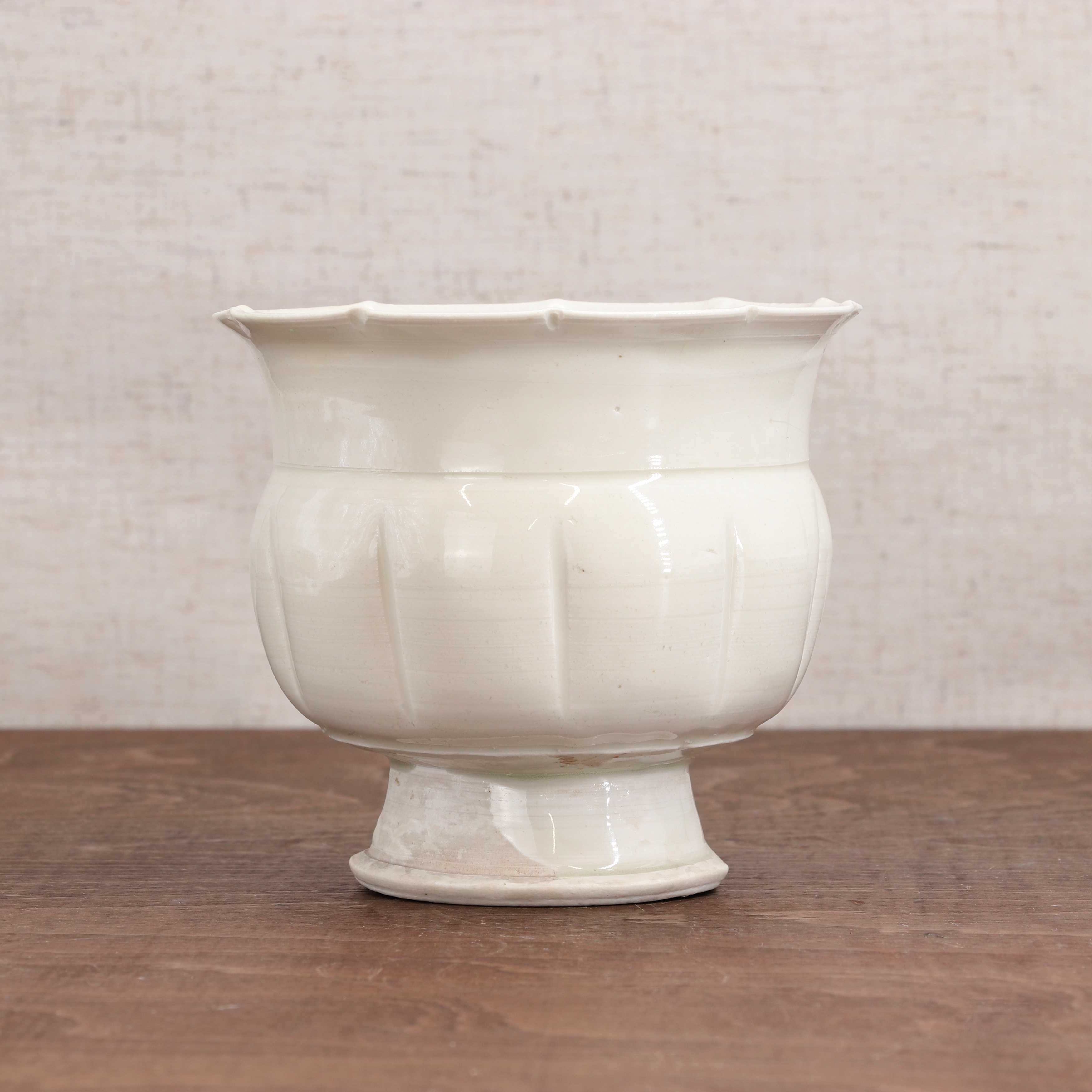Lot 11 - A Chinese Ding ware vase,