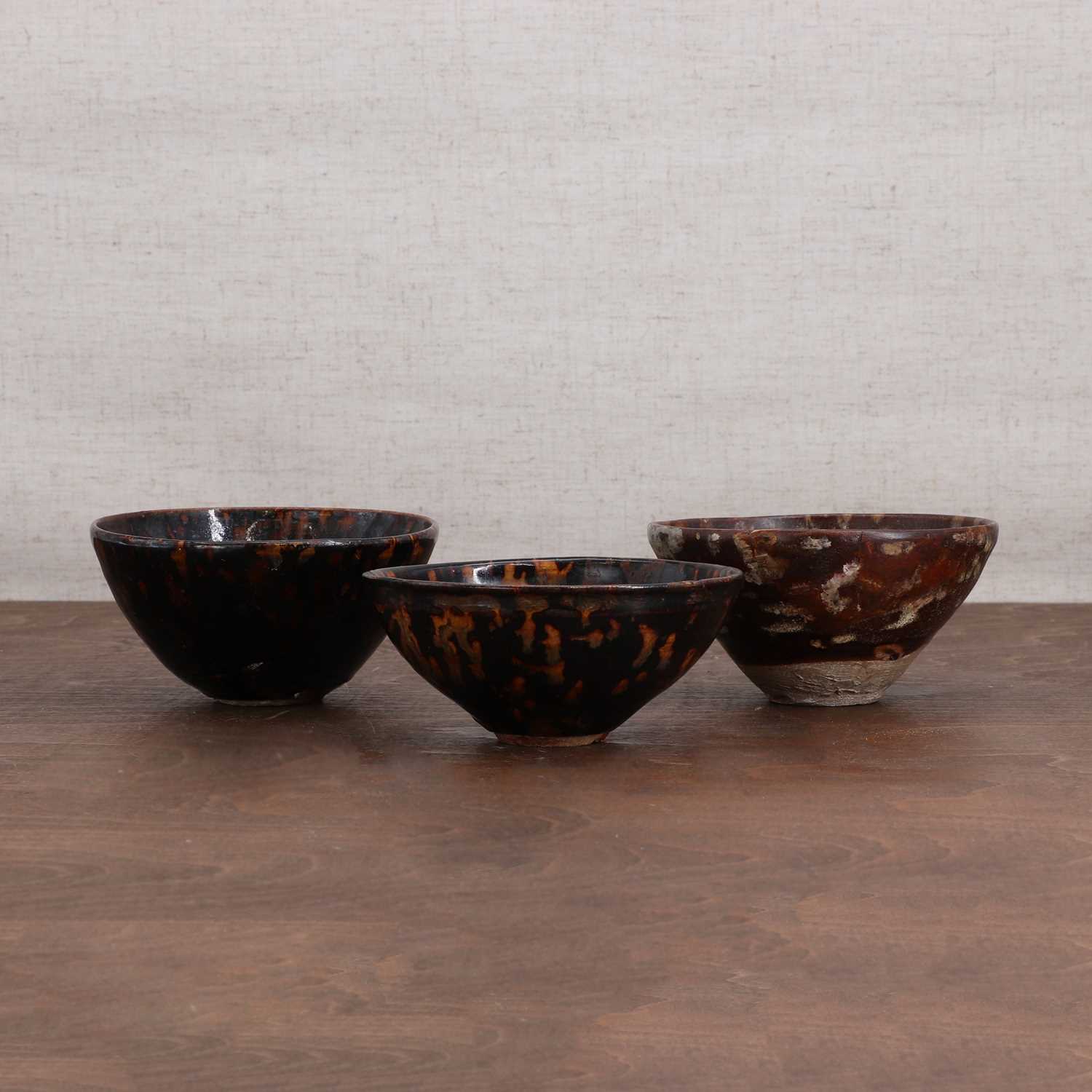 Lot 52 - Three Chinese Jizhou ware bowls,