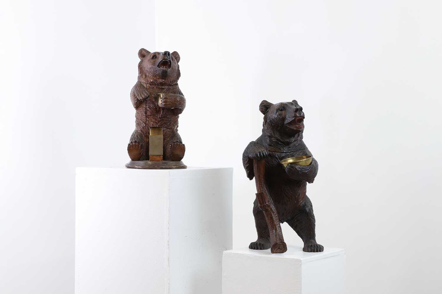 Lot 353 - Two Black Forest carved wood bears,
