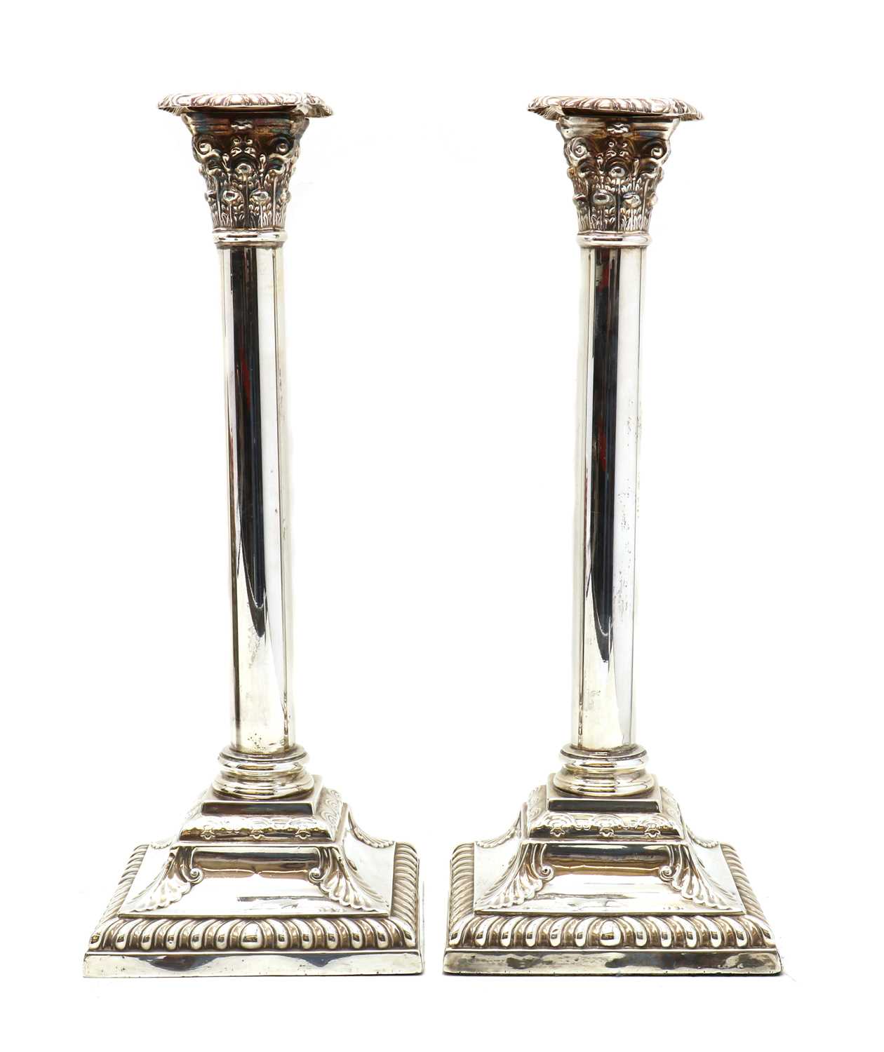 Lot 1 - A pair of Victorian silver candlesticks,
