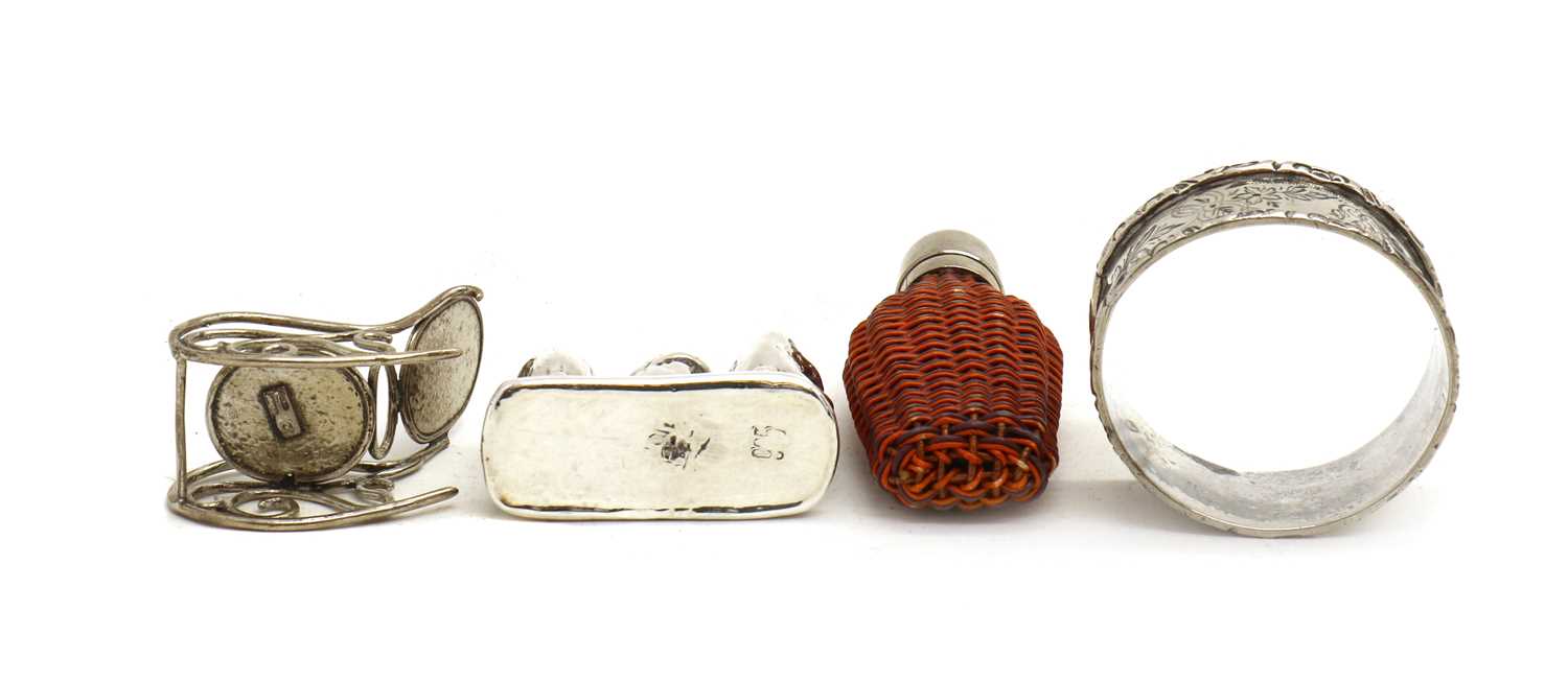 Lot 41 - A set of three enamel spirit labels,