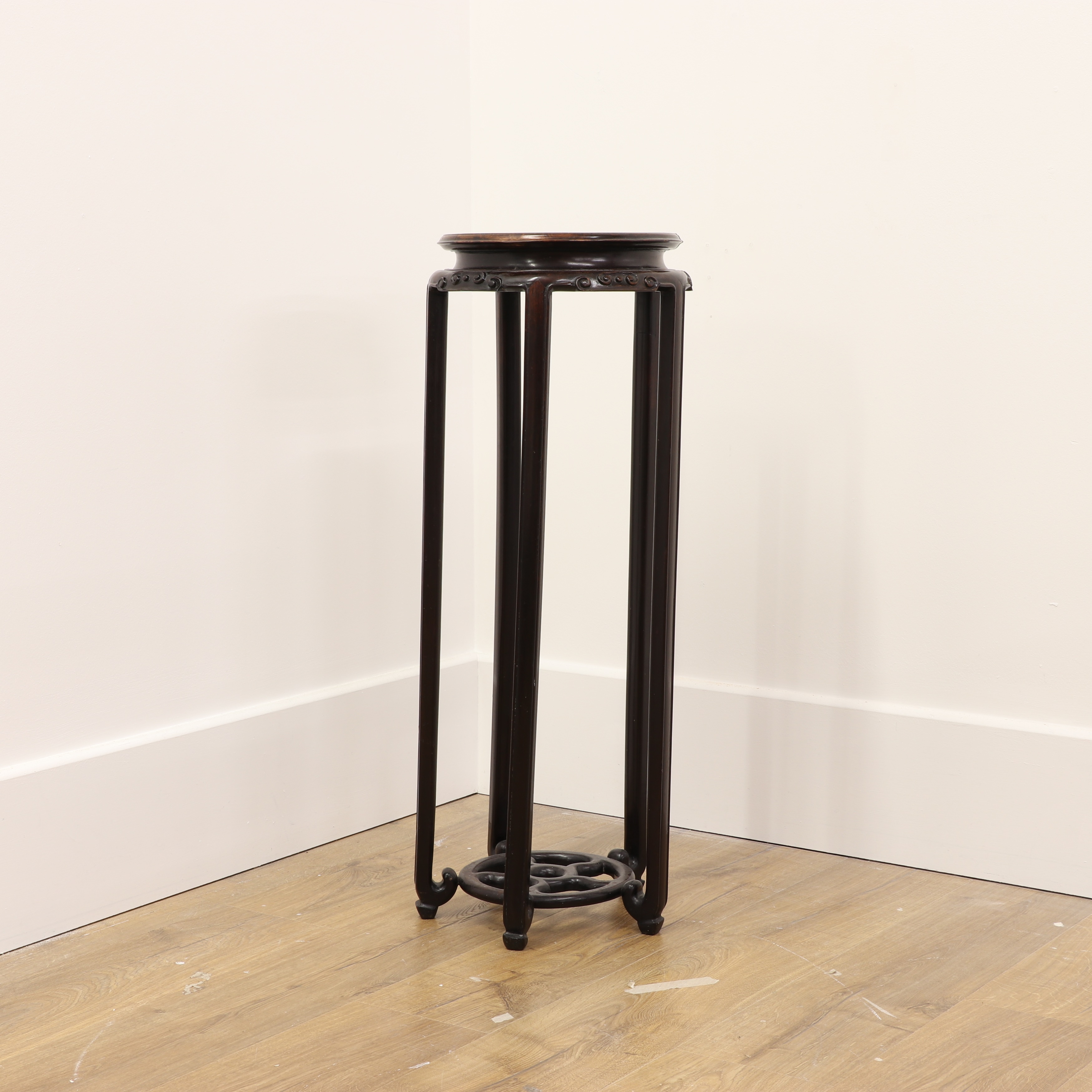 Lot 256 - A Chinese hardwood vase stand,