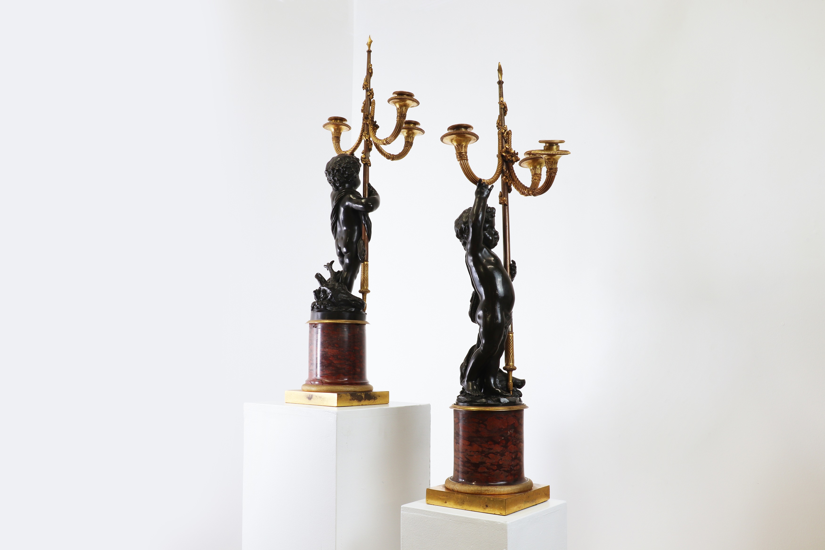 Lot 70 - A pair of French Empire bronze and marble