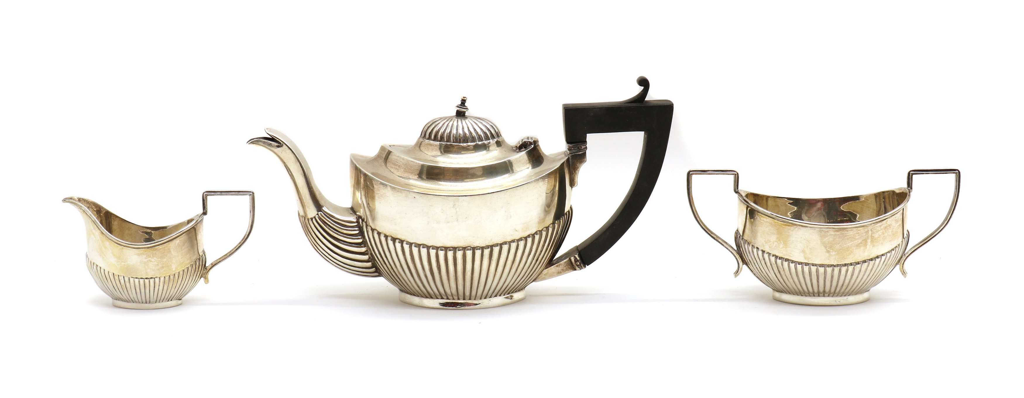Lot 61 - A three piece silver tea service