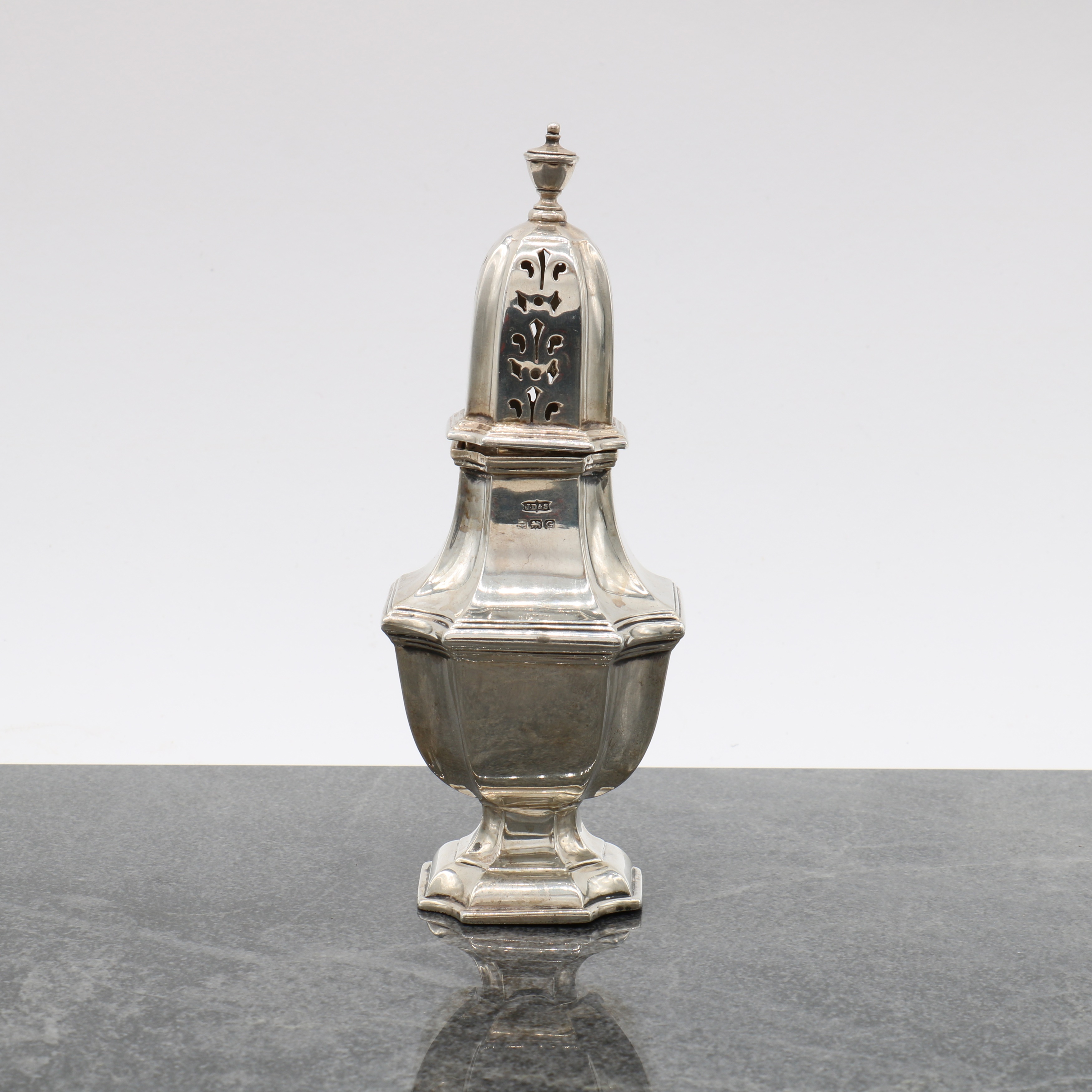 Lot 19 - A silver sugar sifter