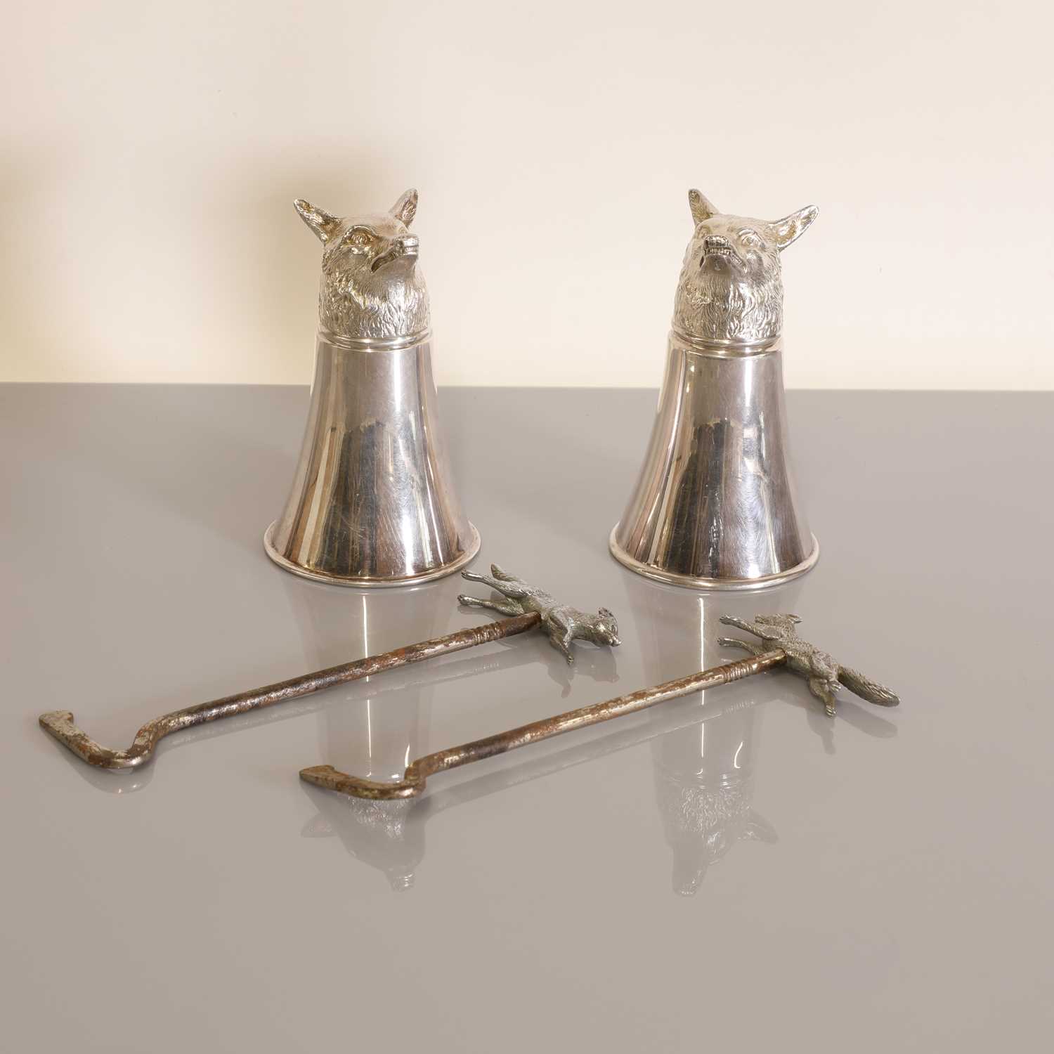 Lot 30 - A pair of silver-plated fox stirrup cups,