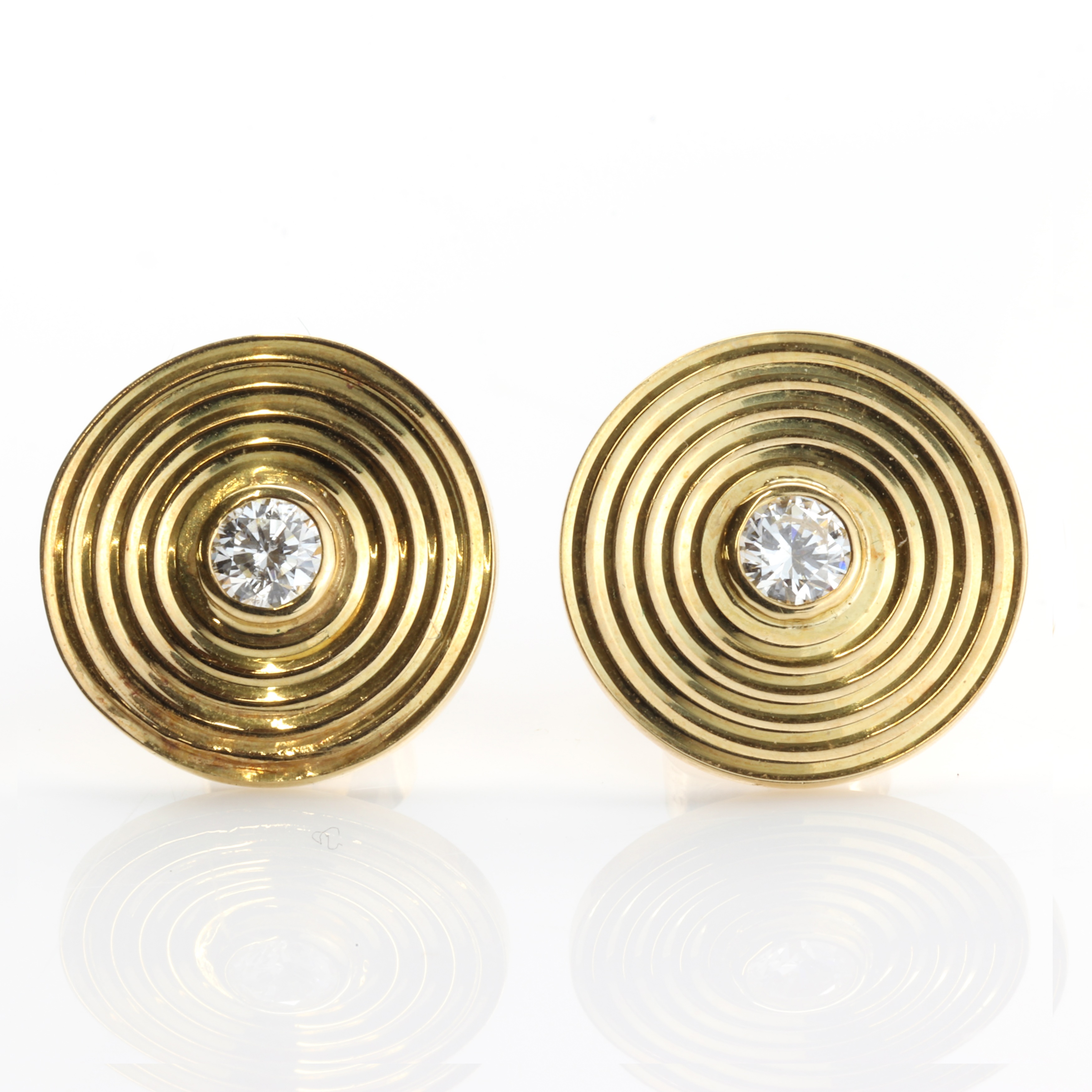 Lot 204 - A pair of 18ct gold diamond set disc style