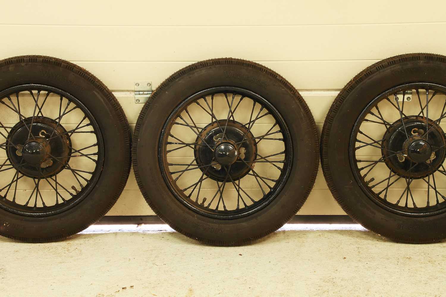 Lot 32 - A set of five Austin 7 wheels,