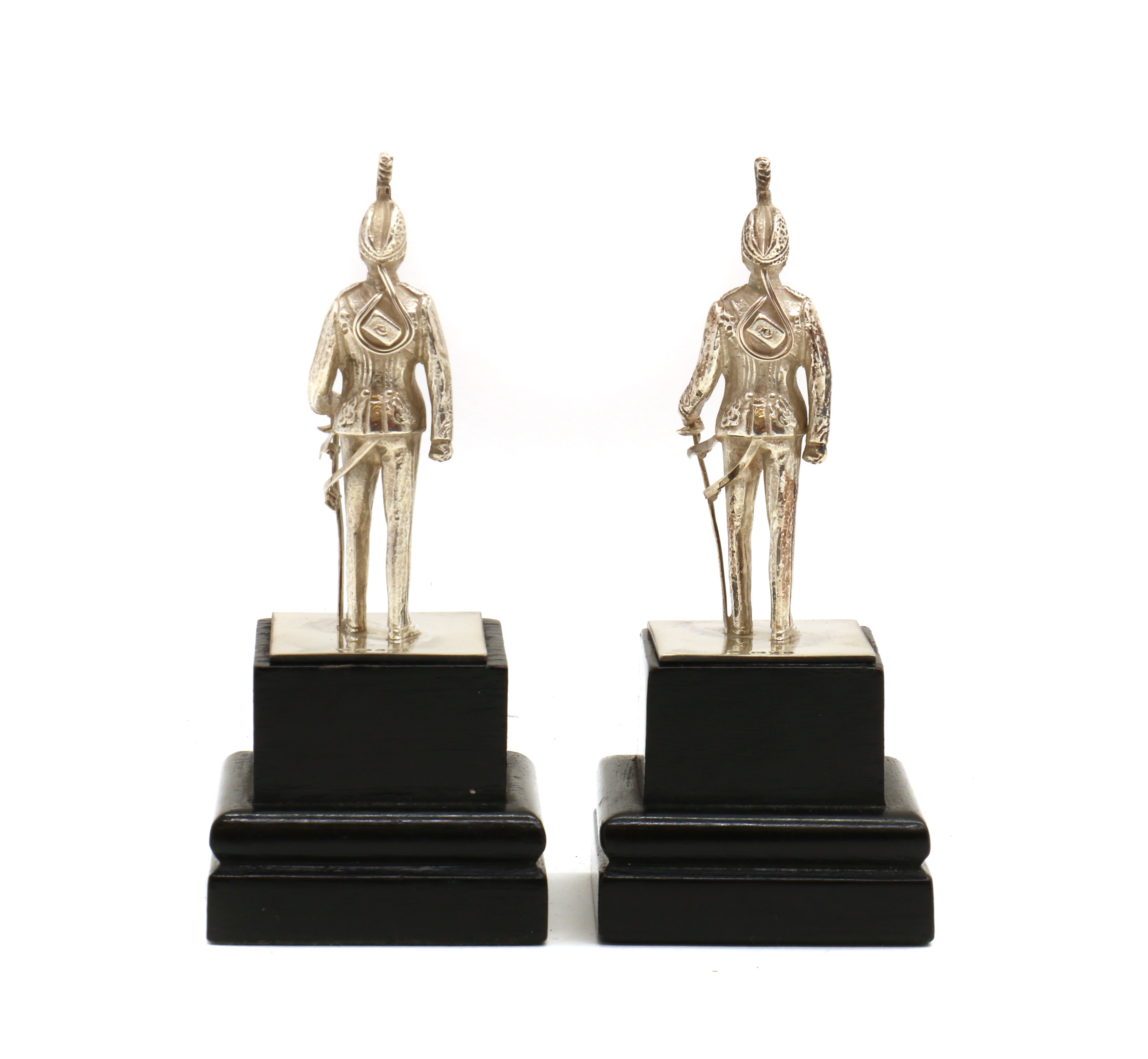 Lot 78 - A pair of silver models of fusilier soldiers,
