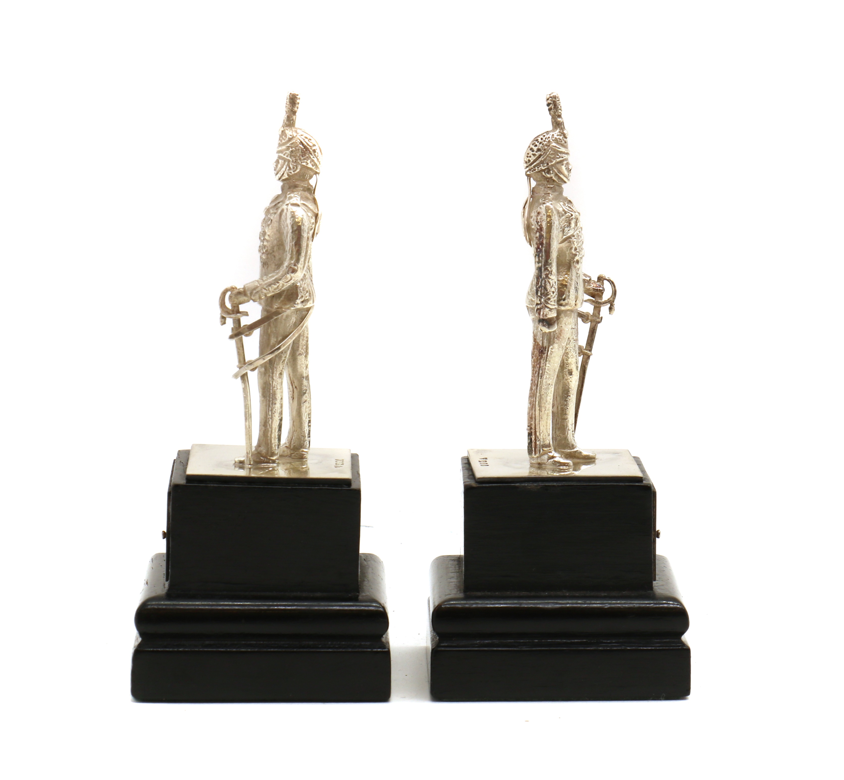 Lot 78 - A pair of silver models of fusilier soldiers,