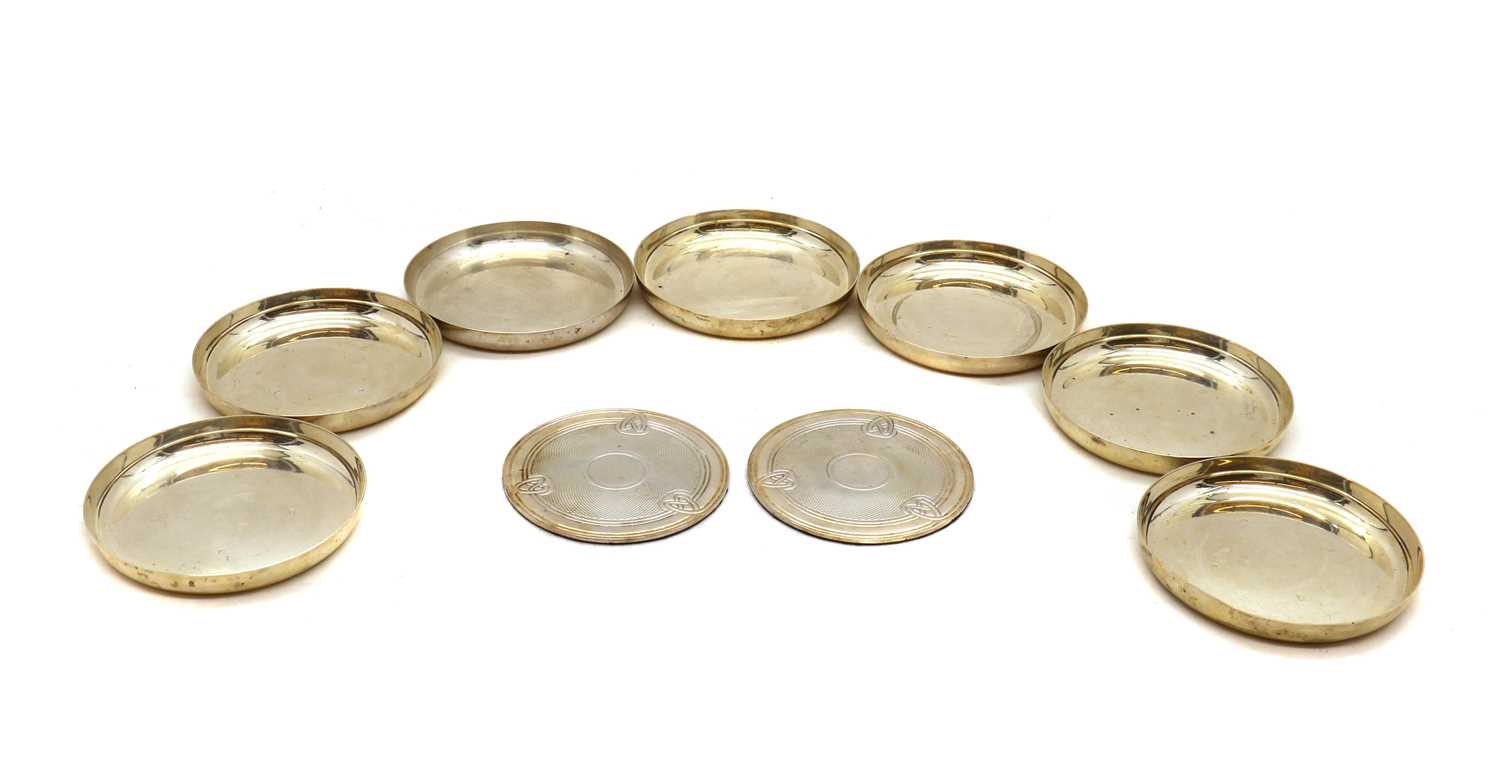 Lot 91 - A group of seven silver coasters,