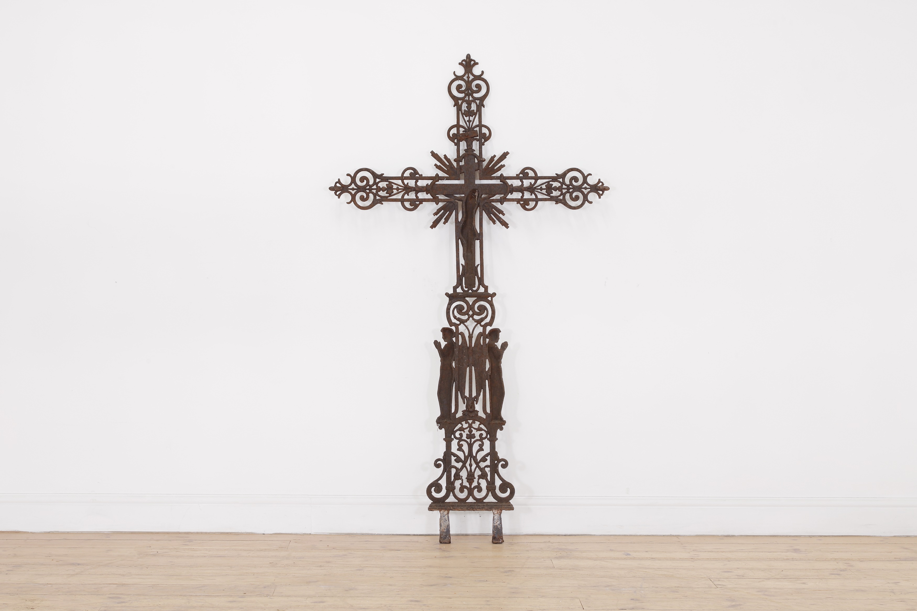 Lot 600 - A wrought-iron crucifix,