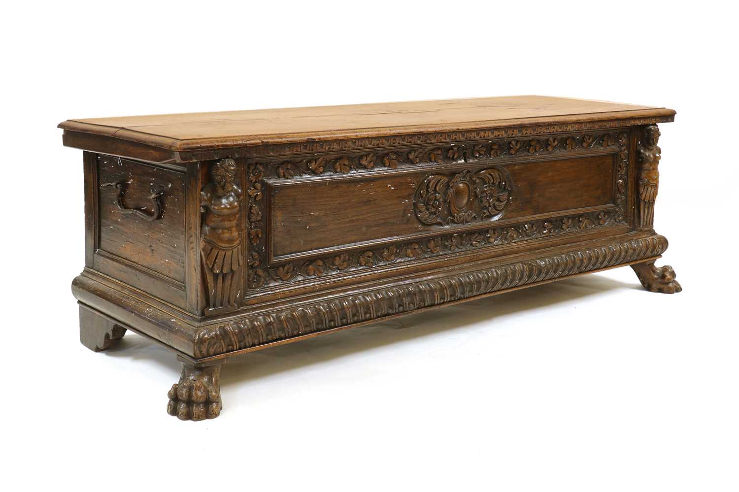 Lot 403 - An Italian Baroque-style carved oak cassone