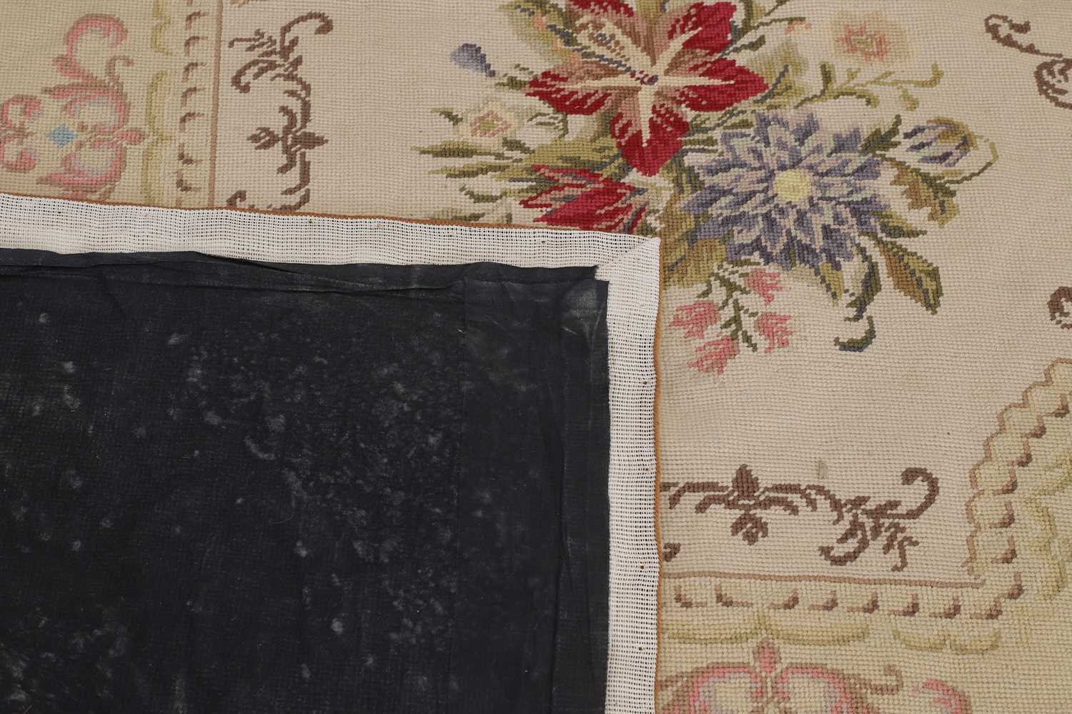 Lot 193 - A Regency-style needlepoint carpet,