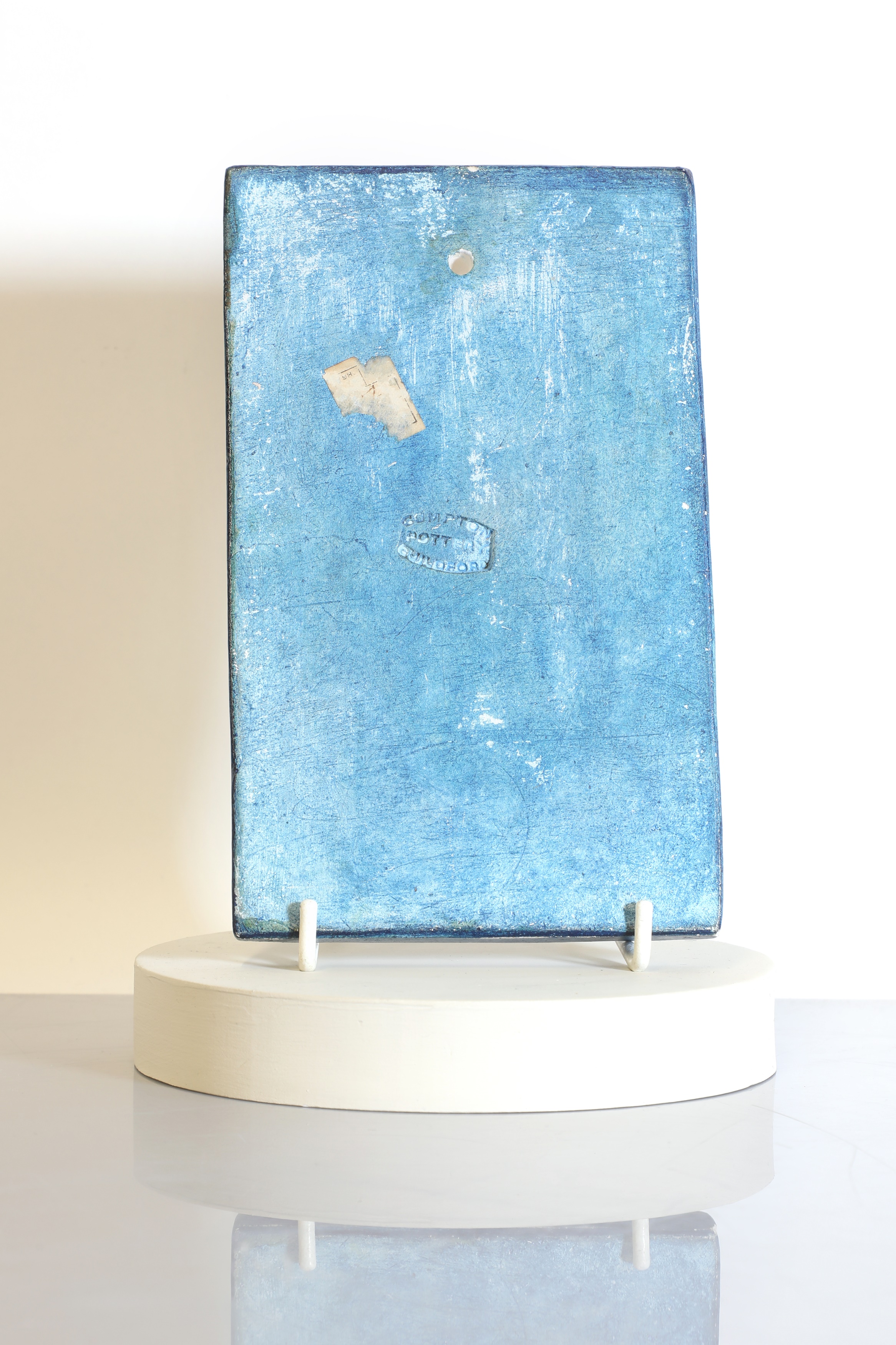 Lot 59 - A Compton Pottery low-relief plaque,