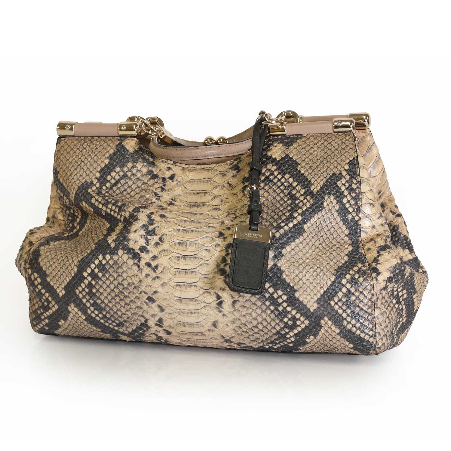 Lot 331 - A Coach python embossed leather handbag,