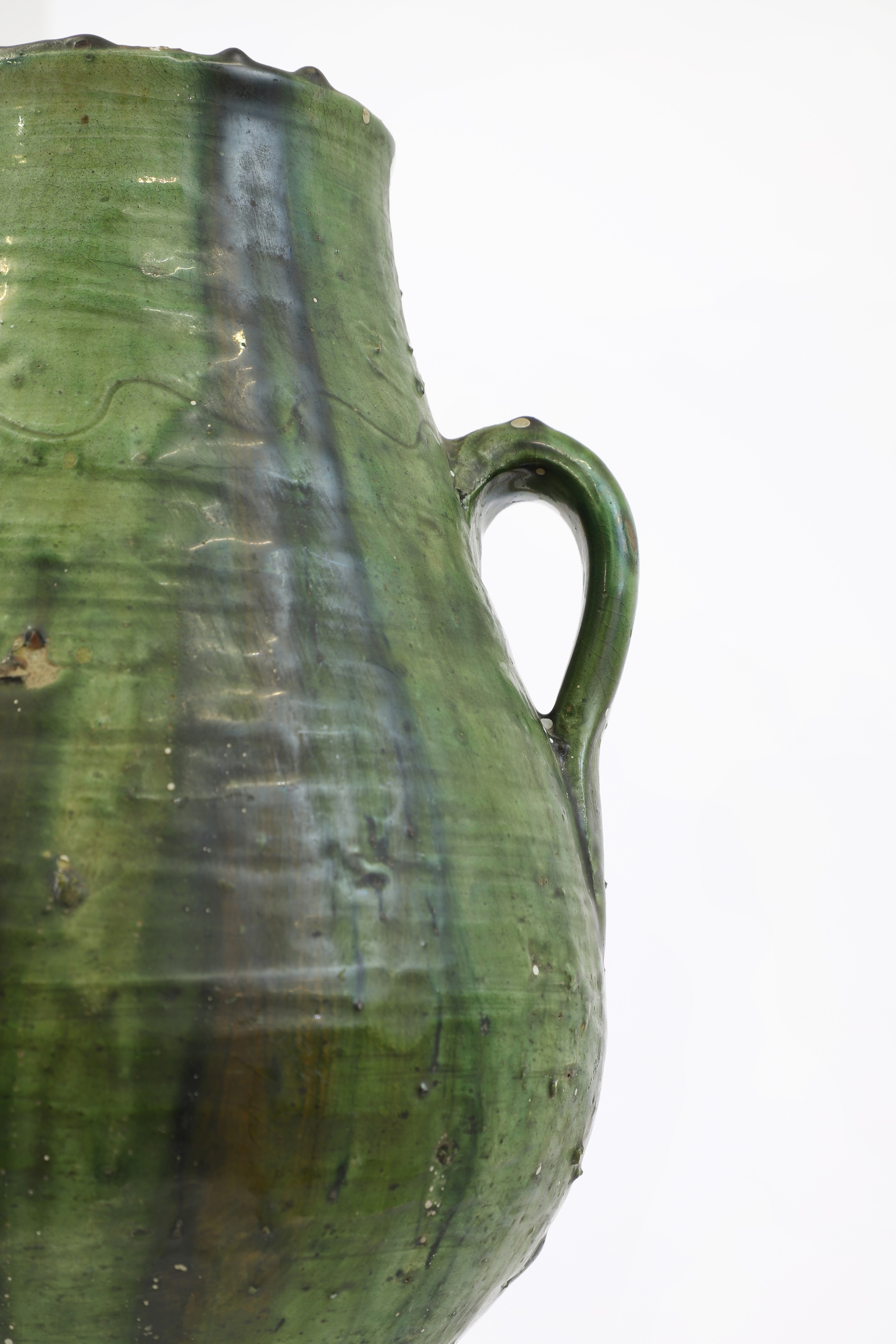Lot 448 - A green-glazed stoneware pot,