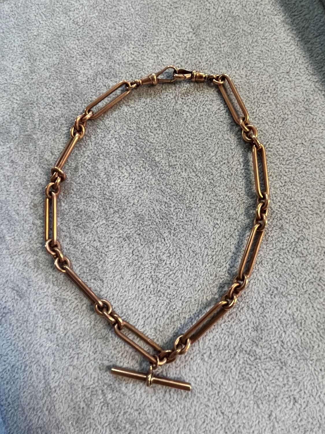 Lot 217 - A 9ct gold fetter link Albert chain,