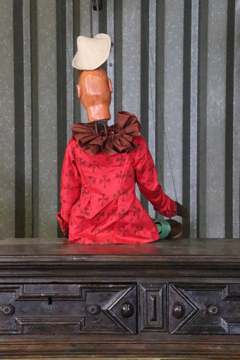 Lot 45 - A painted fruitwood Pinocchio puppet,