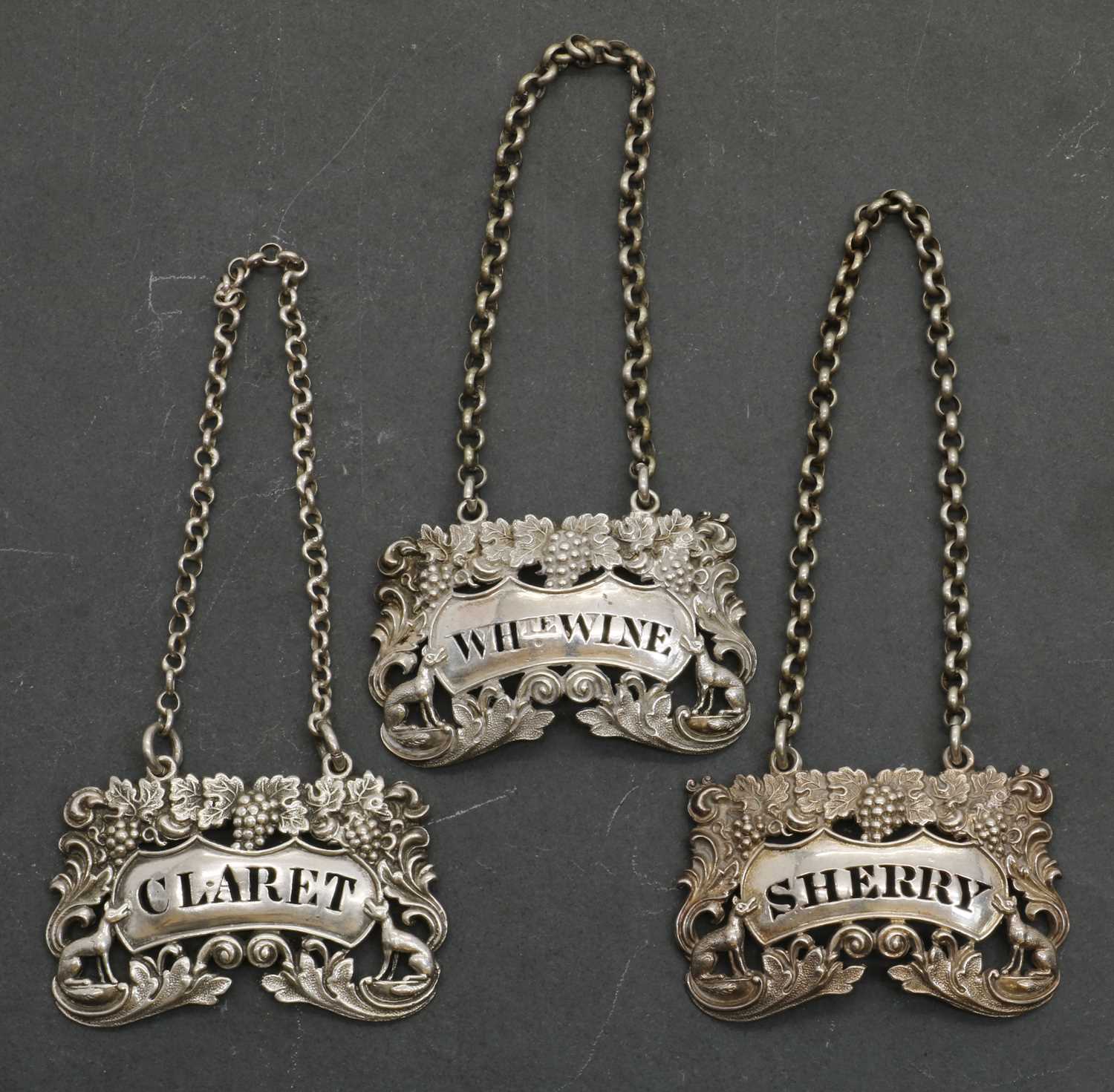 Lot 17 - A group of three William IV silver decanter