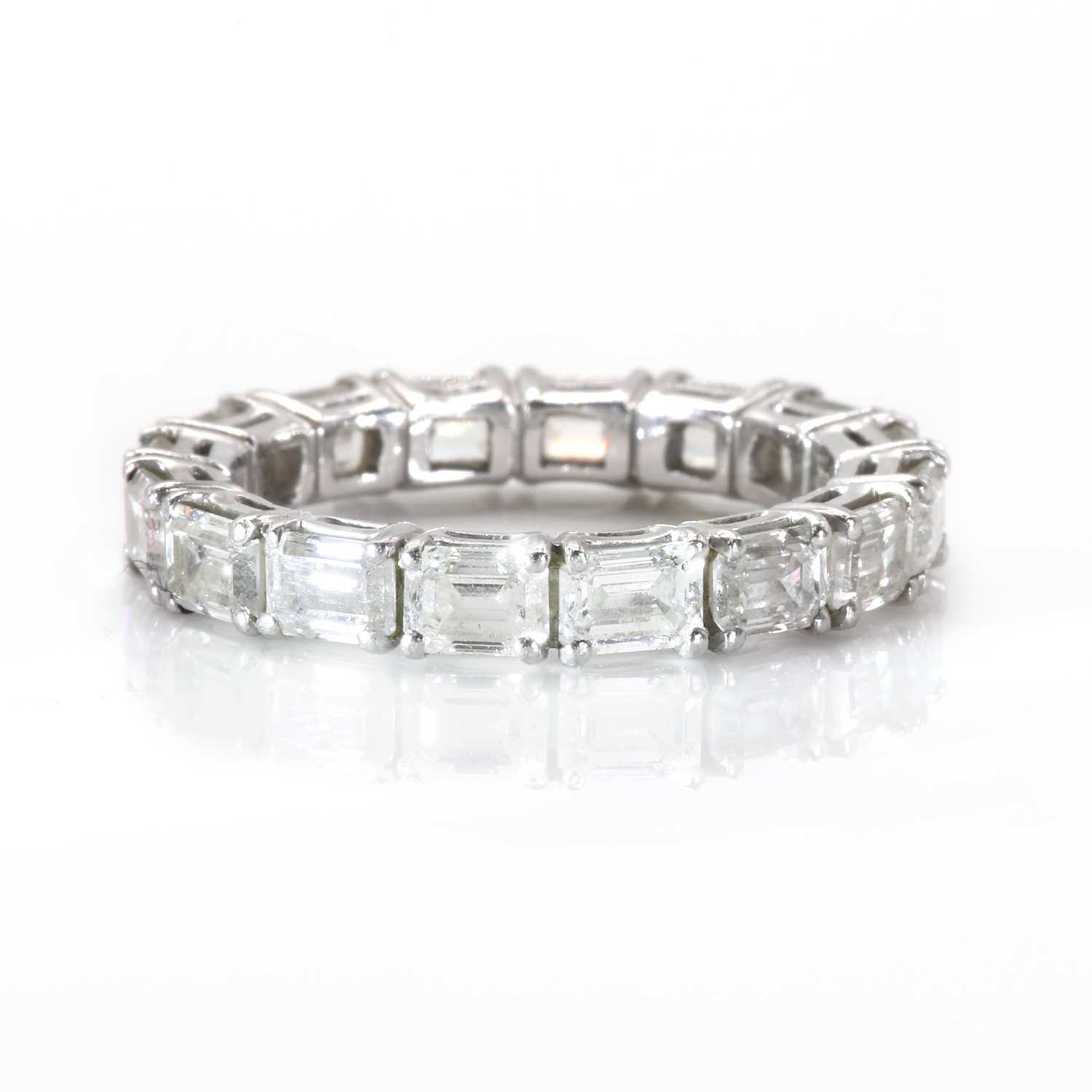 Lot 148 - A platinum diamond set full eternity ring,