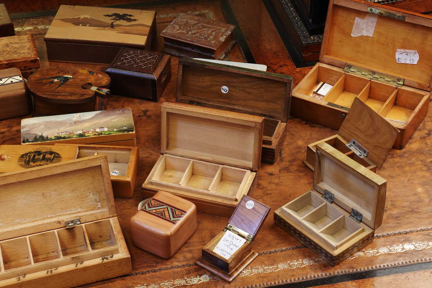 Lot 132 - A collection of wood stamp boxes,