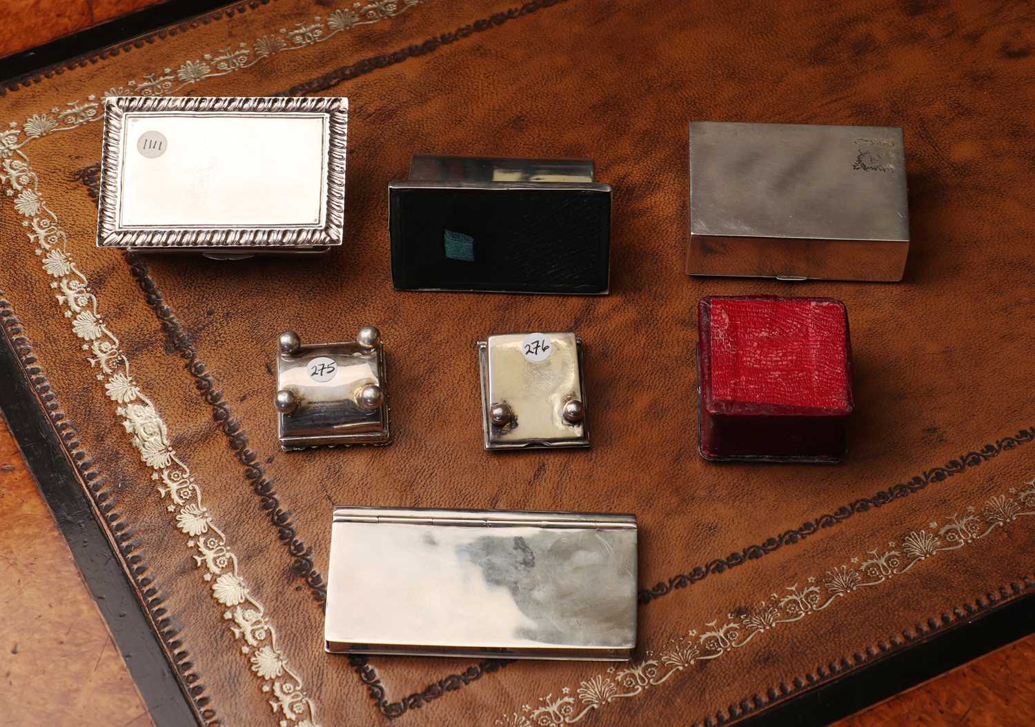 Lot 86 - A group of silver stamp boxes