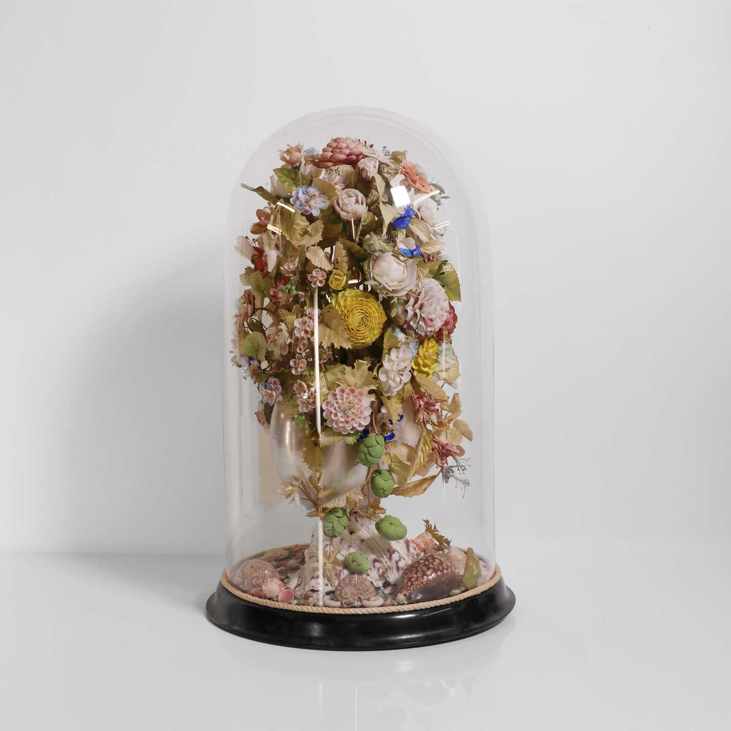 Lot 217 - A shellwork floral display,