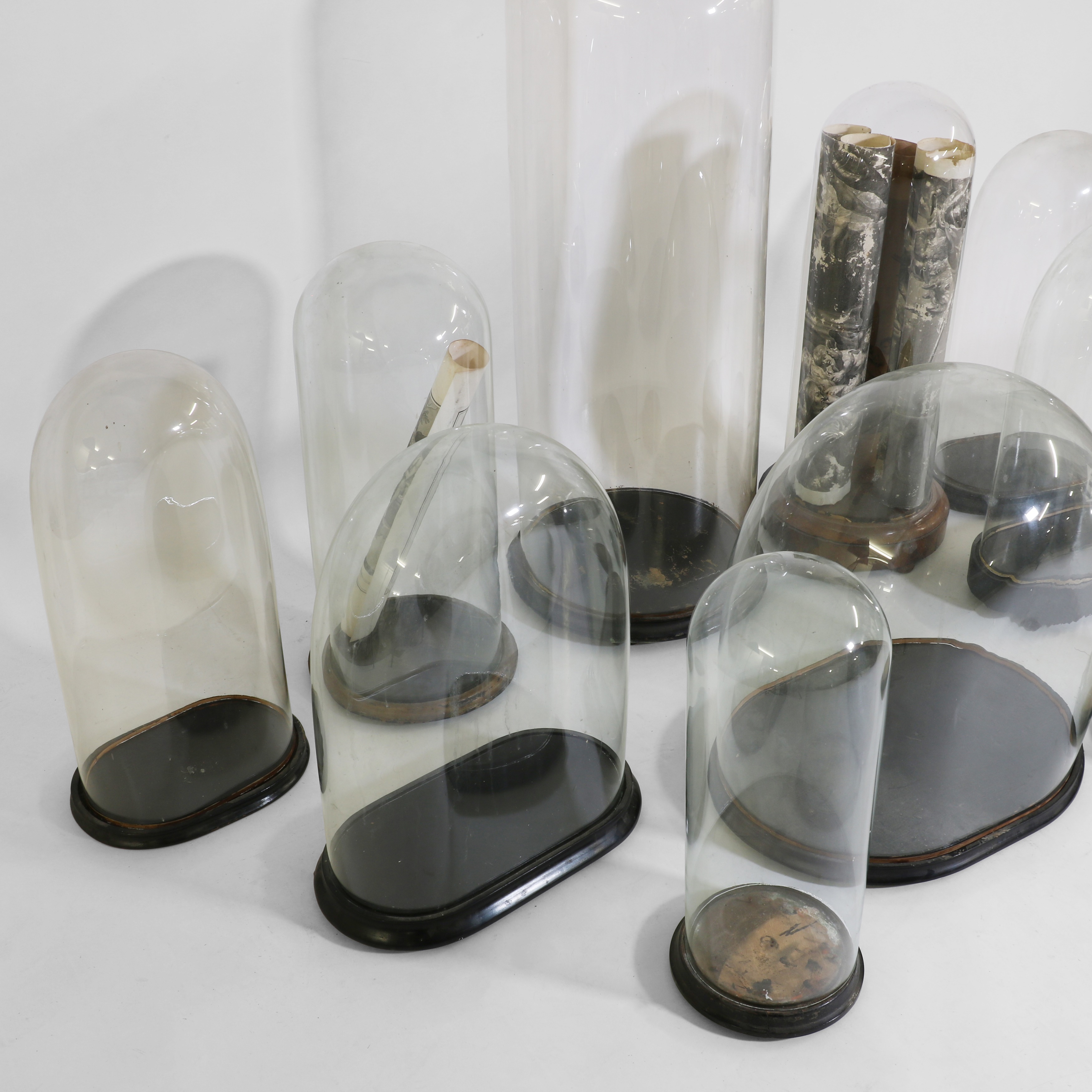 Lot 36 - A group of ten Victorian glass domes,
