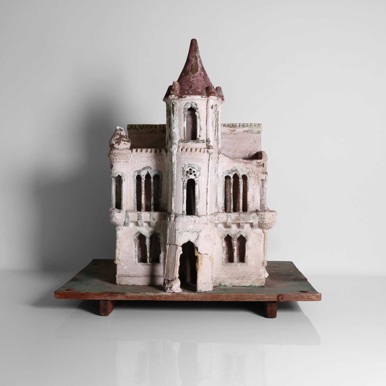 Lot 267 - A folk art plaster model of a house,