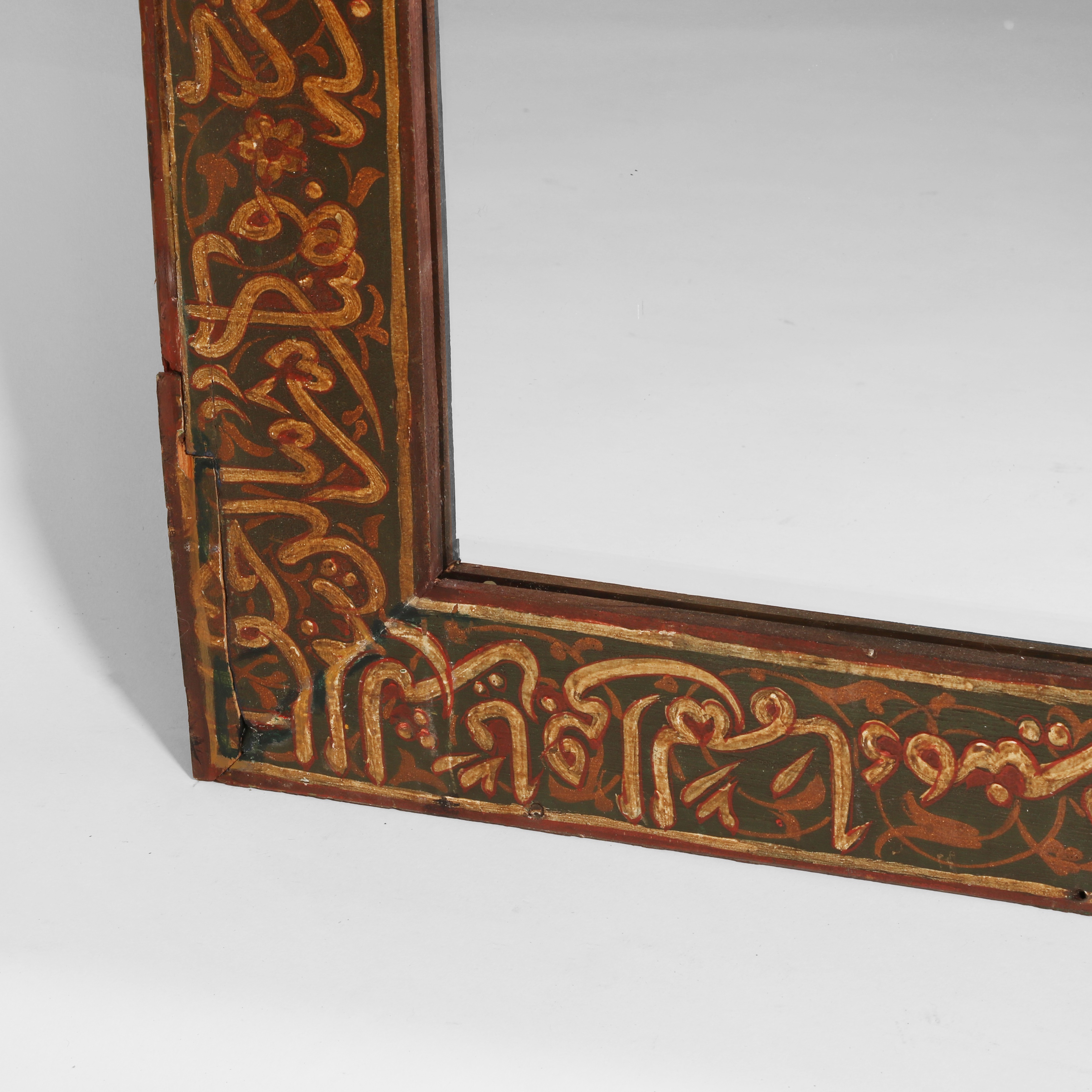 Lot 150 - A painted wall mirror,