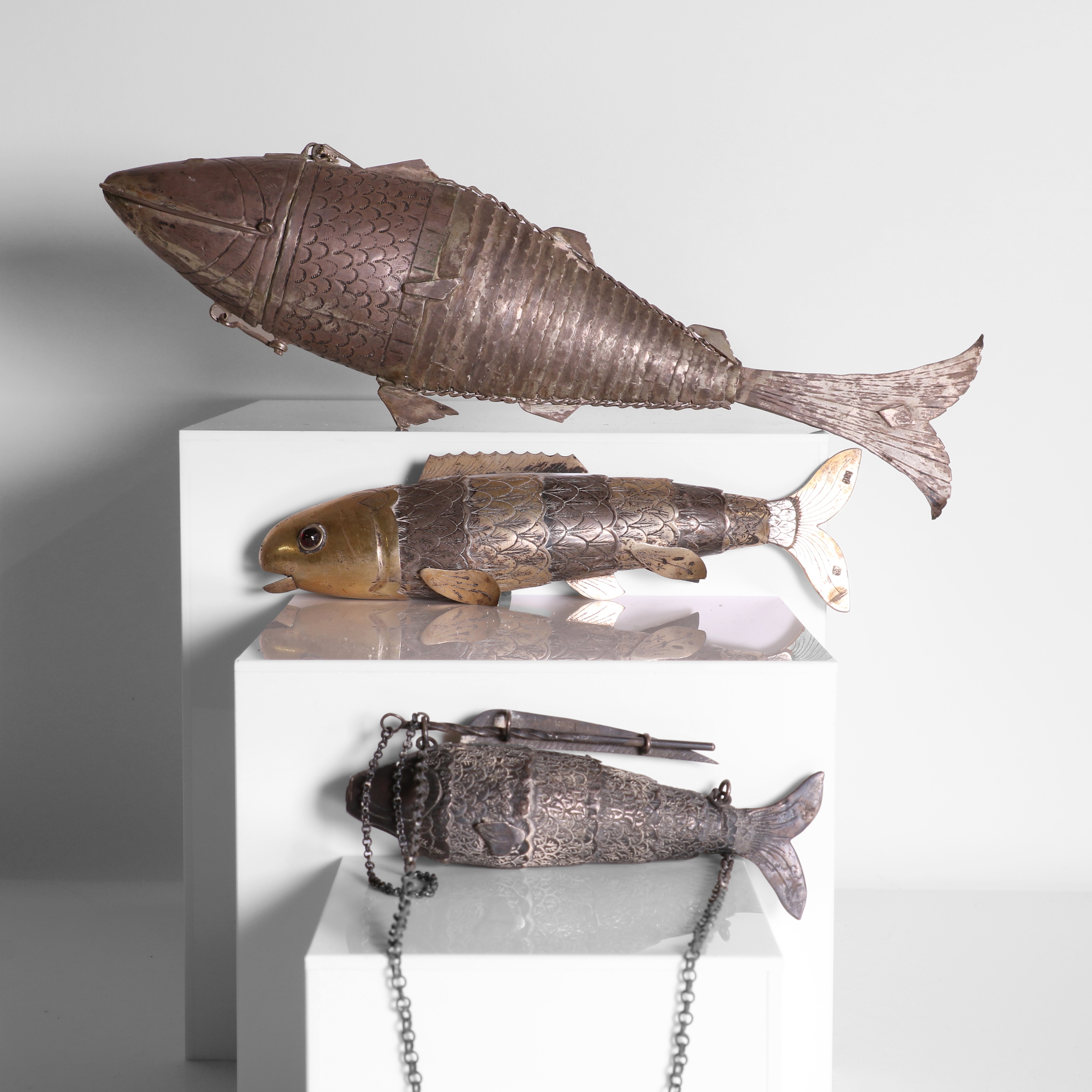 Lot 262 - Two silver articulated fish,