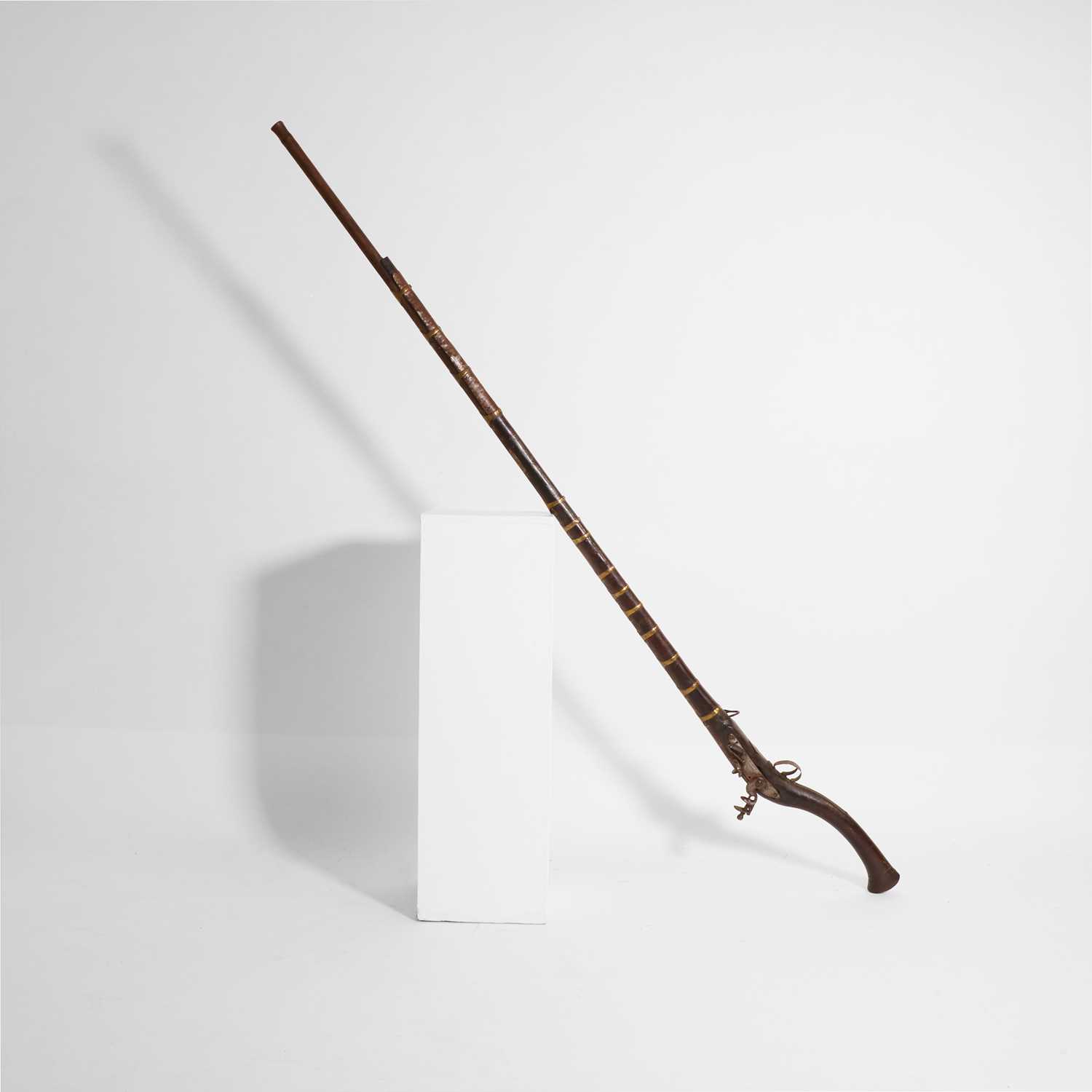 Lot 201 - A 10-bore flintlock musket,