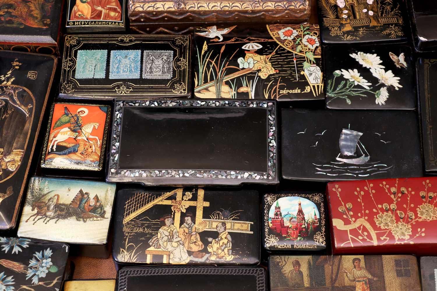 Lot 137 - A group of lacquered stamp boxes,