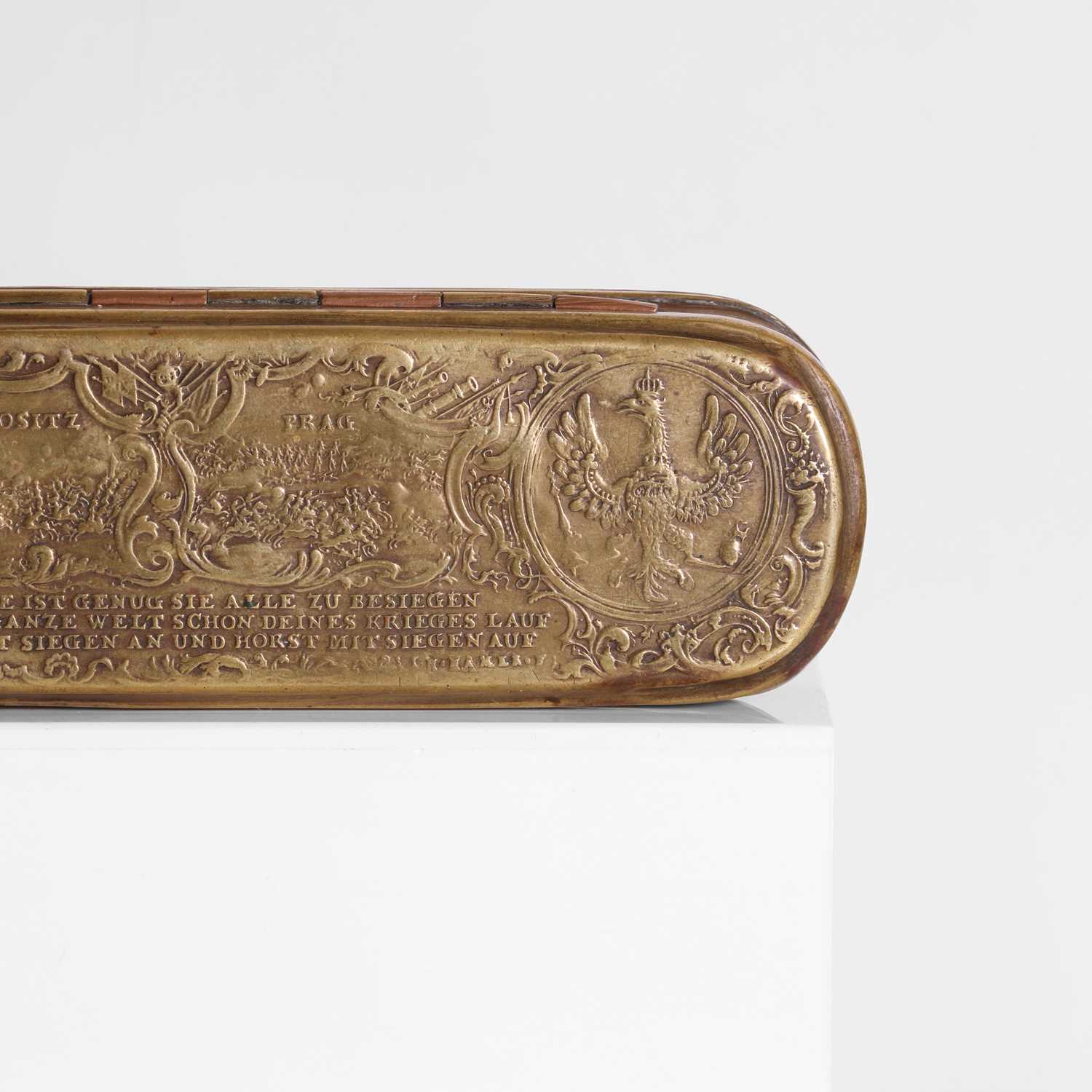 Lot 39 - A brass and copper tobacco box,