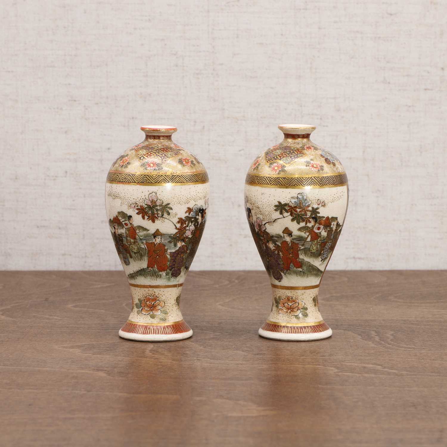 Lot 204 - A pair of Japanese Satsuma ware vases,