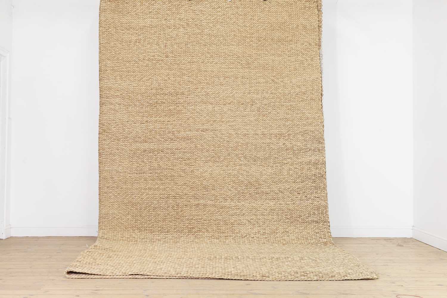 Lot 99 - A large abaca carpet,