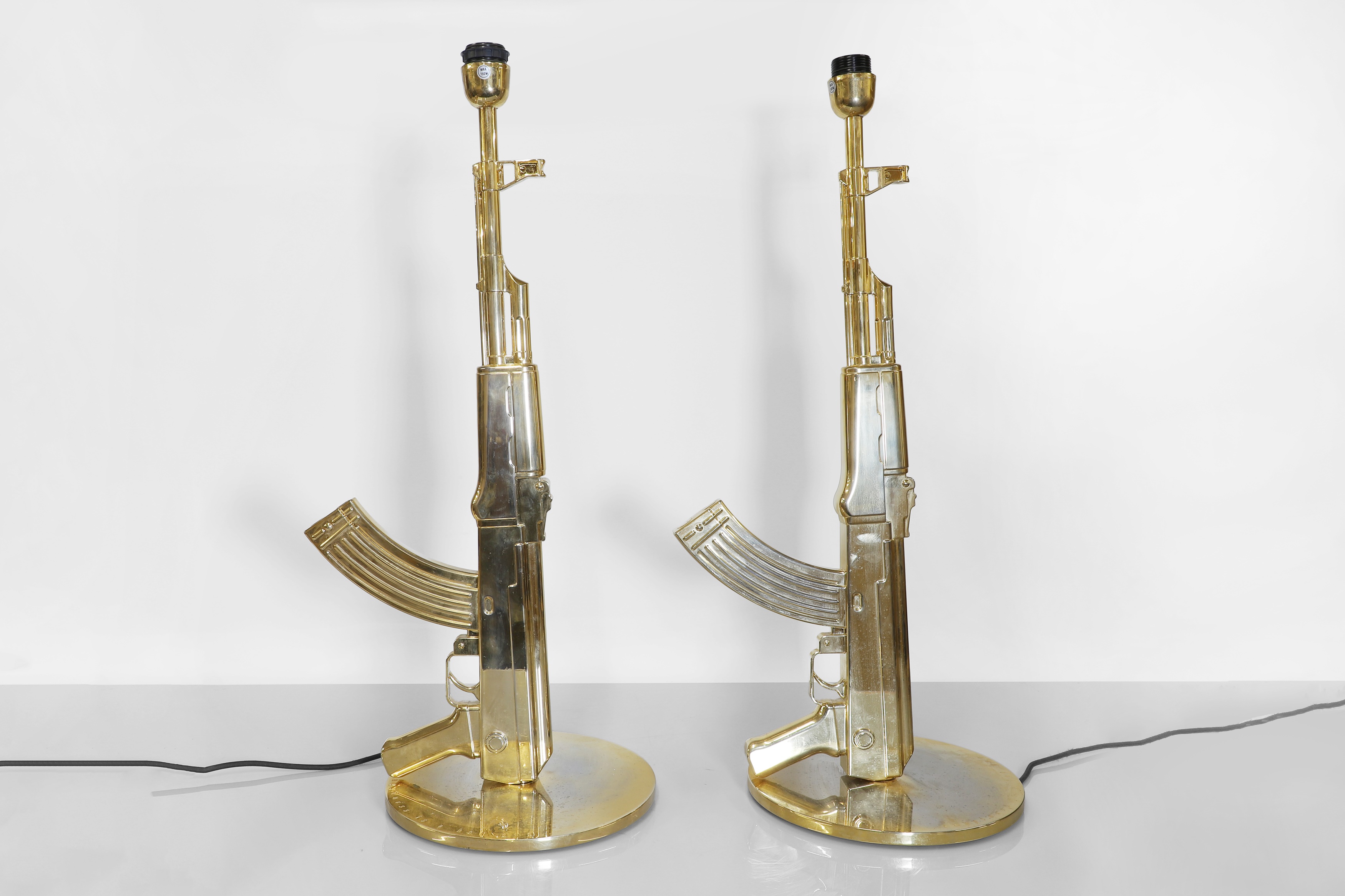 Lot 292 - A pair of Italian 'Gun' table lamps,