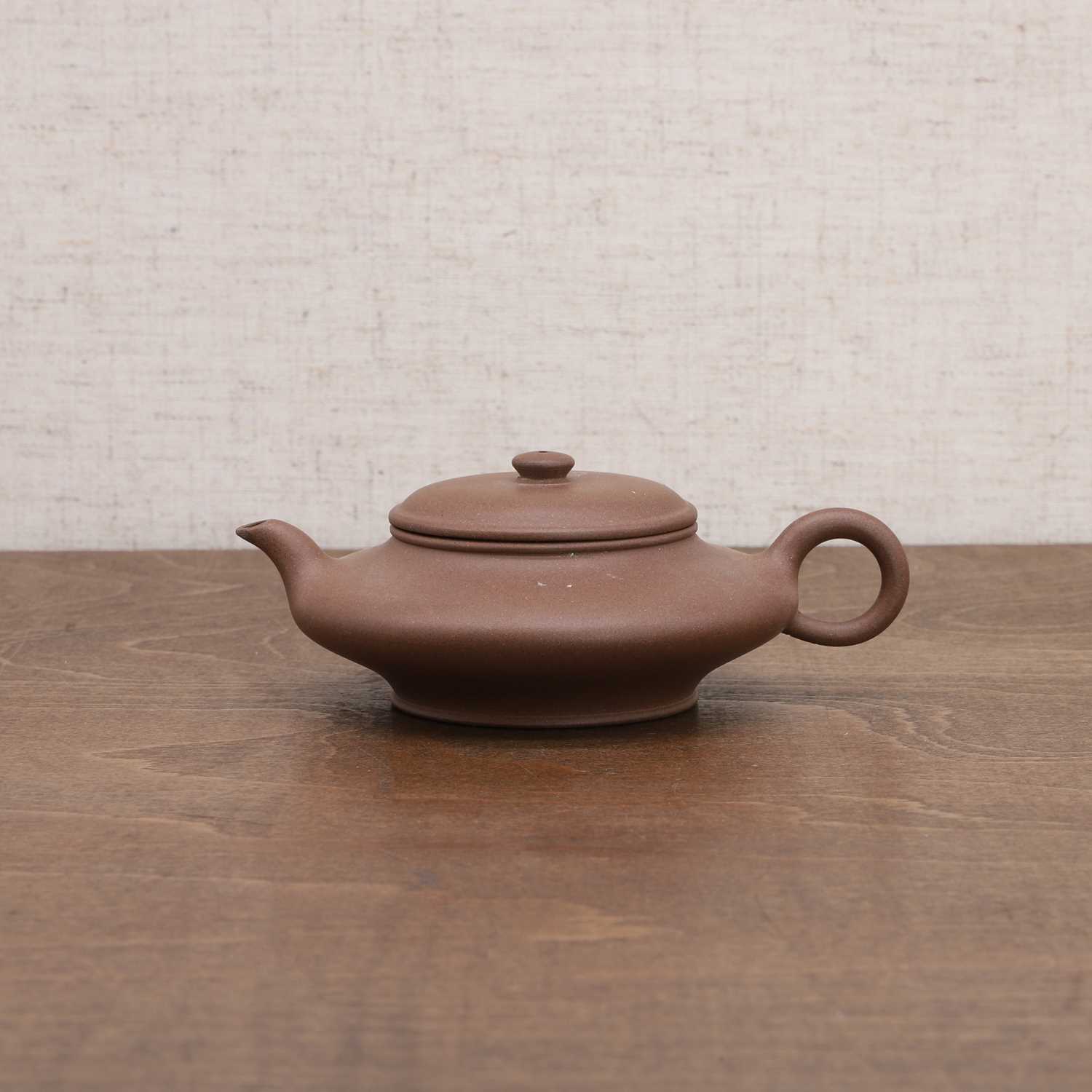 Lot 102 - A Chinese Yixing zisha teapot,