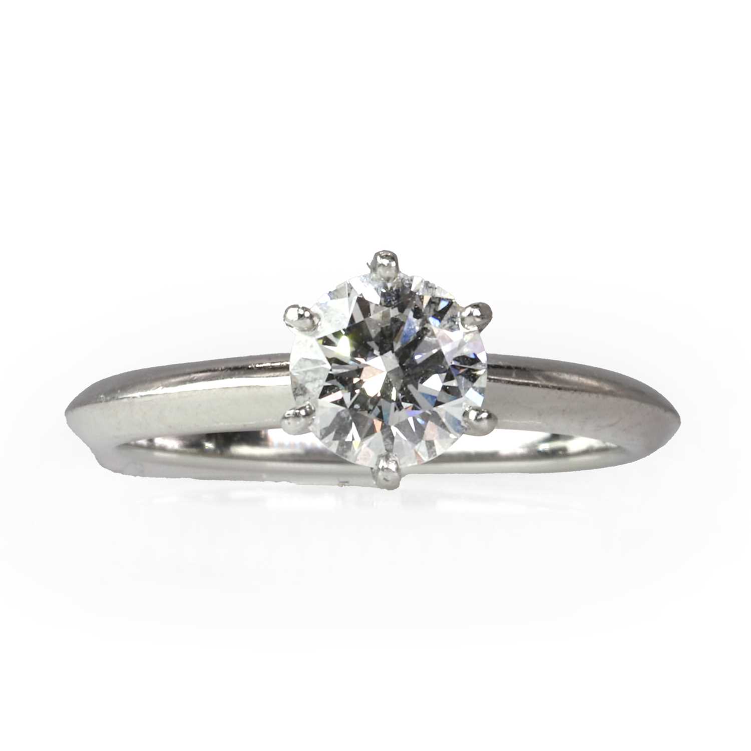 Lot 229 - A platinum diamond single stone ring, by