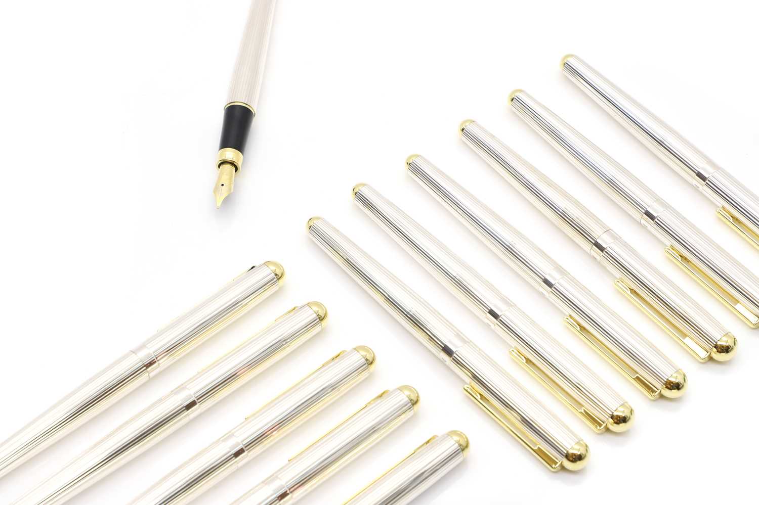 Lot 47 - A group of twelve silver fountain pens
