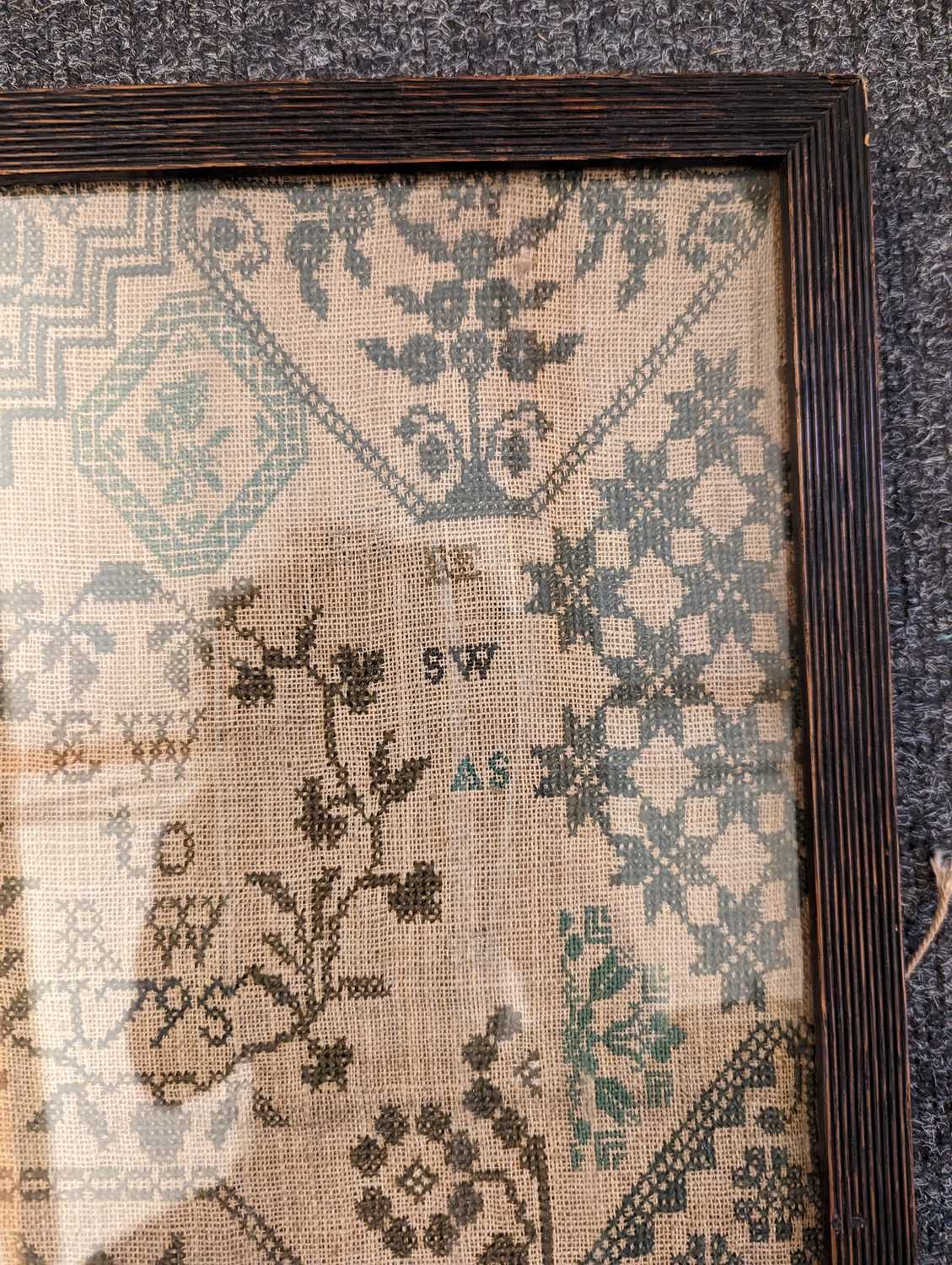 Lot 294 - A needlework sampler,