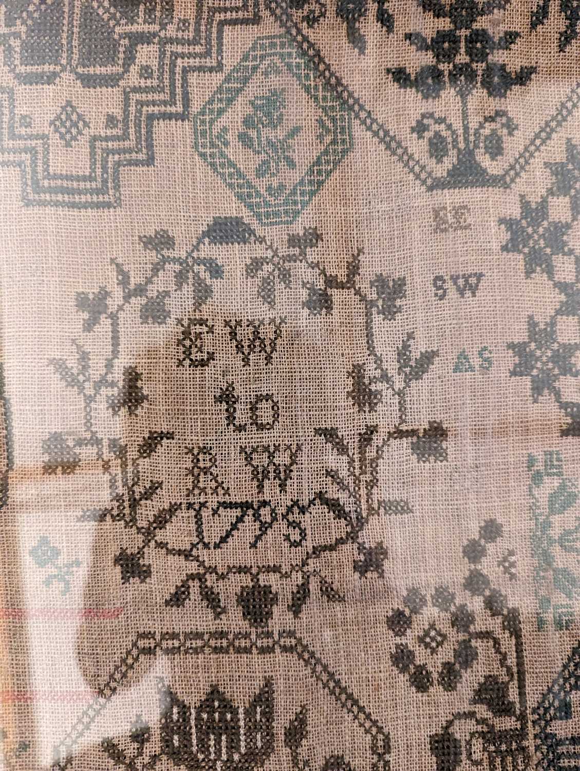 Lot 294 - A needlework sampler,