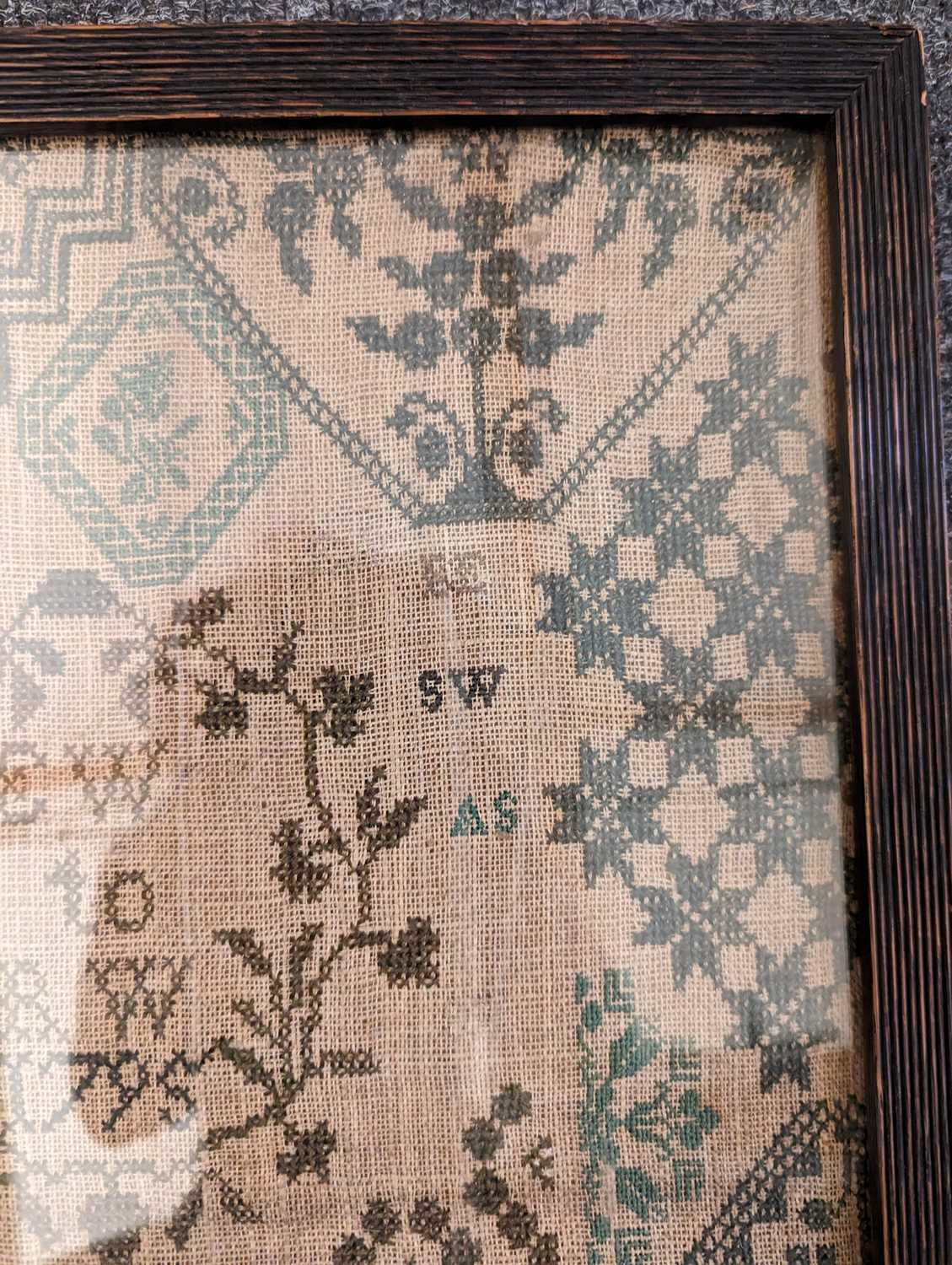 Lot 294 - A needlework sampler,