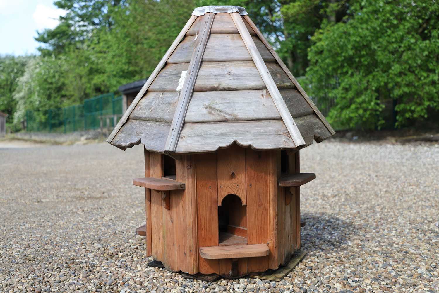 Lot 574 - A large wood dovecote