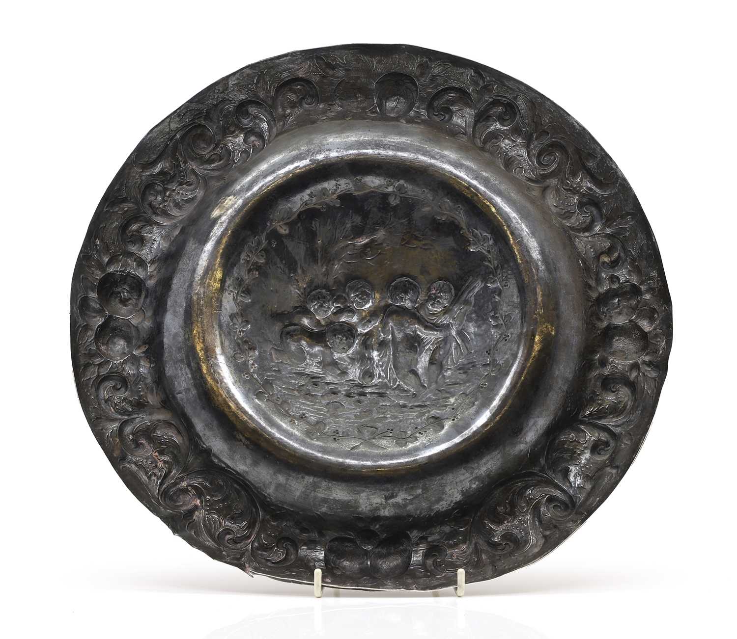 Lot 24 - A large embossed silver plaque