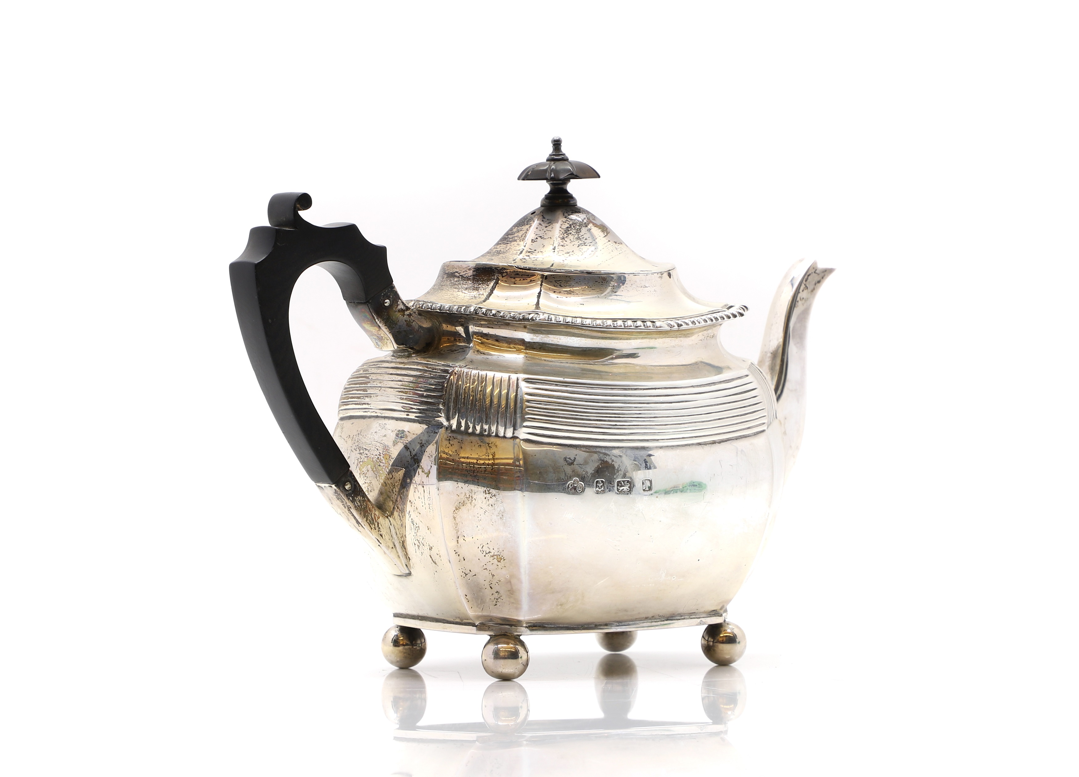 Lot 1 - A silver teapot