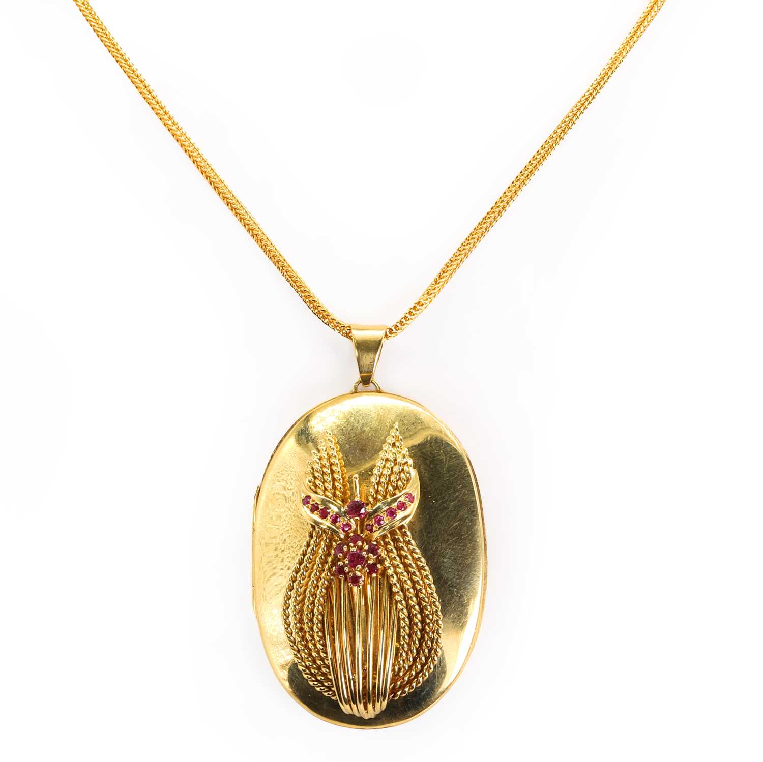 Lot 249 - An 18ct gold ruby locket pendant,