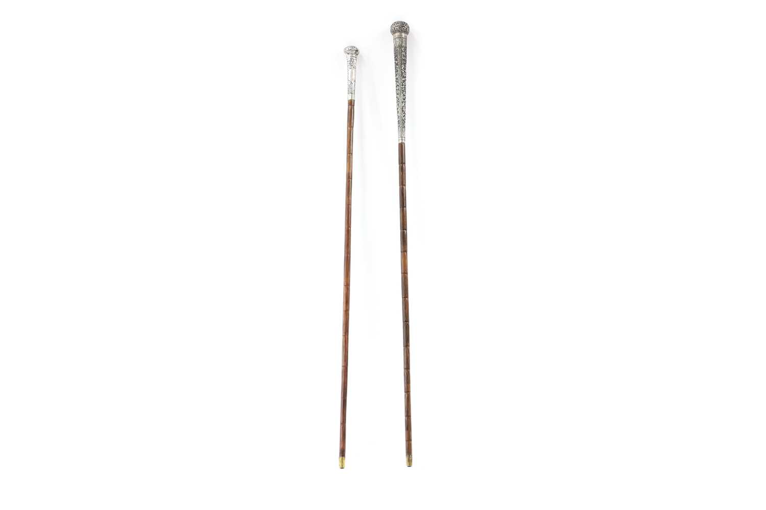 Lot 93 - Two silver mounted sword sticks