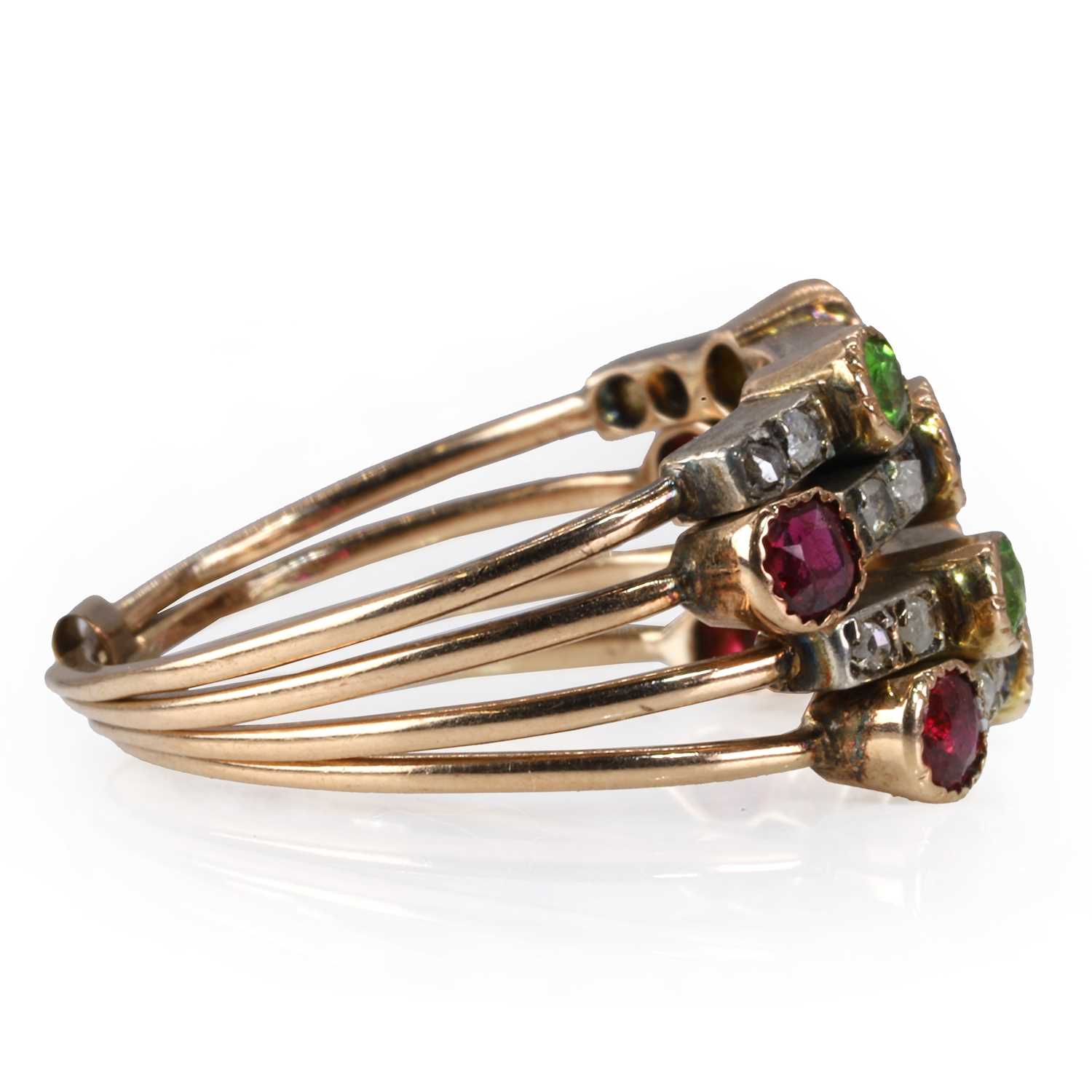 Lot 42 - An Edwardian demantoid garnet, ruby, sapphire,
